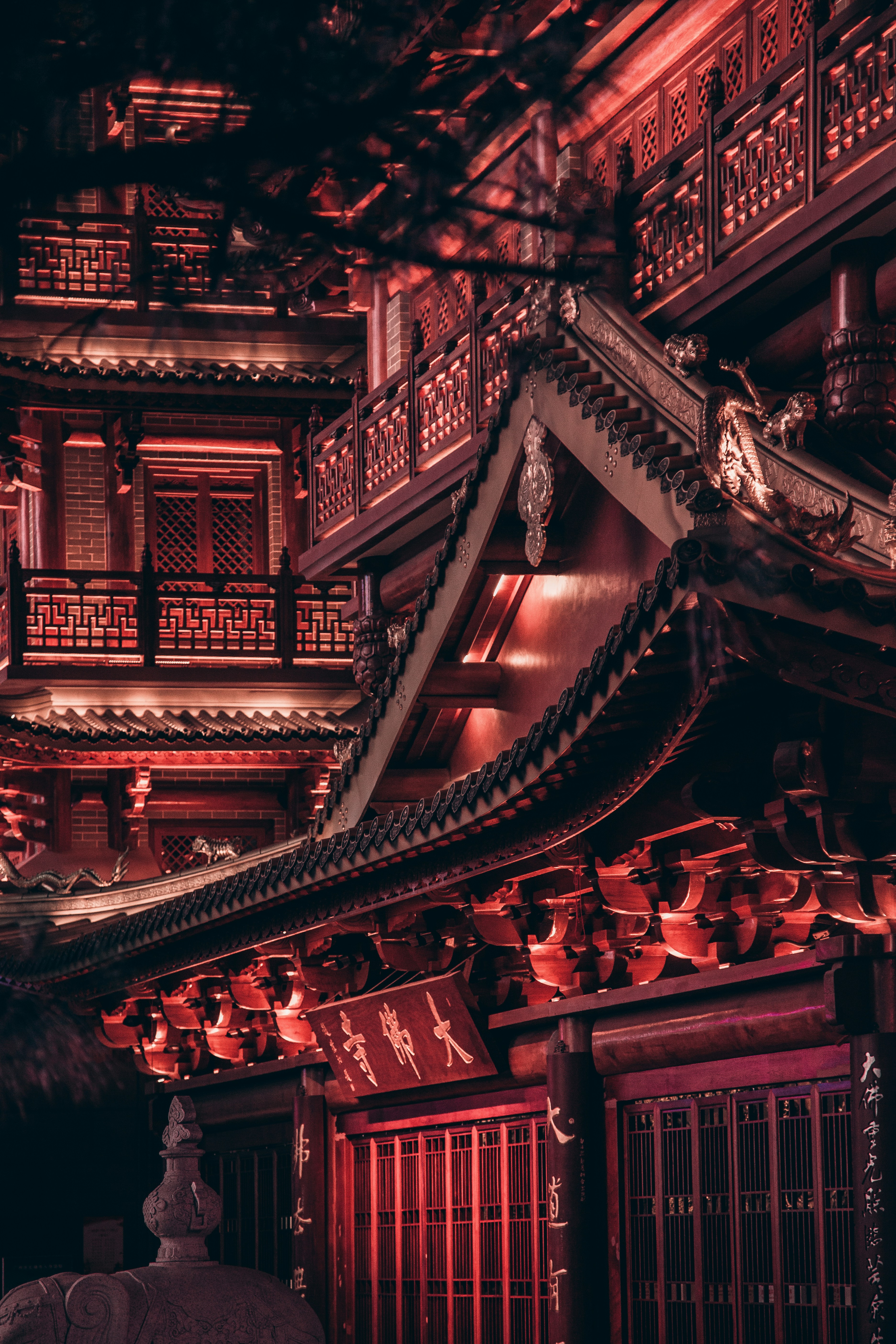 Crimson Eaves at Night: A Temple's Tapestry of Curves and Lantern Light