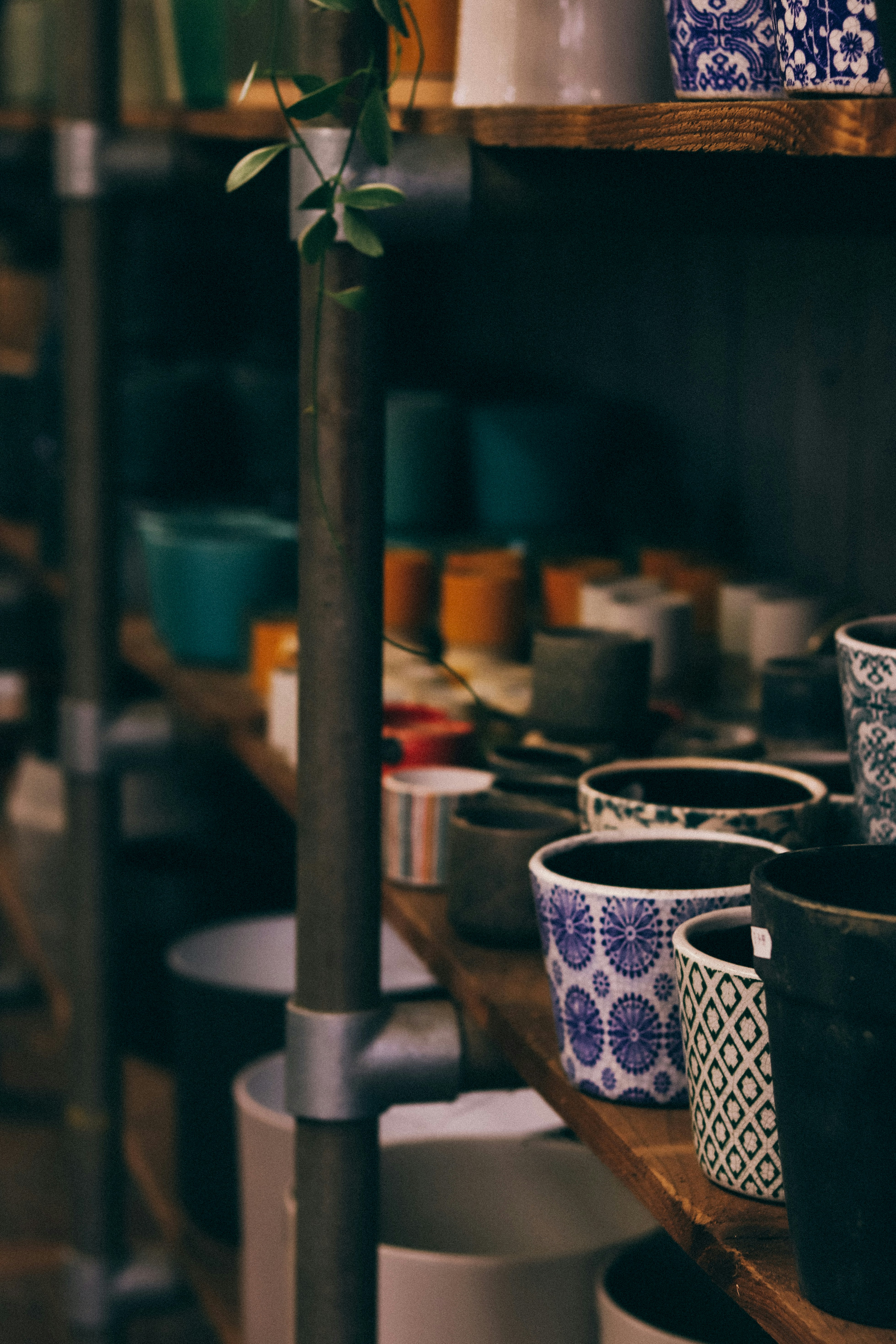 A bunch of pots that are on a shelf photo – Free China Image on Unsplash