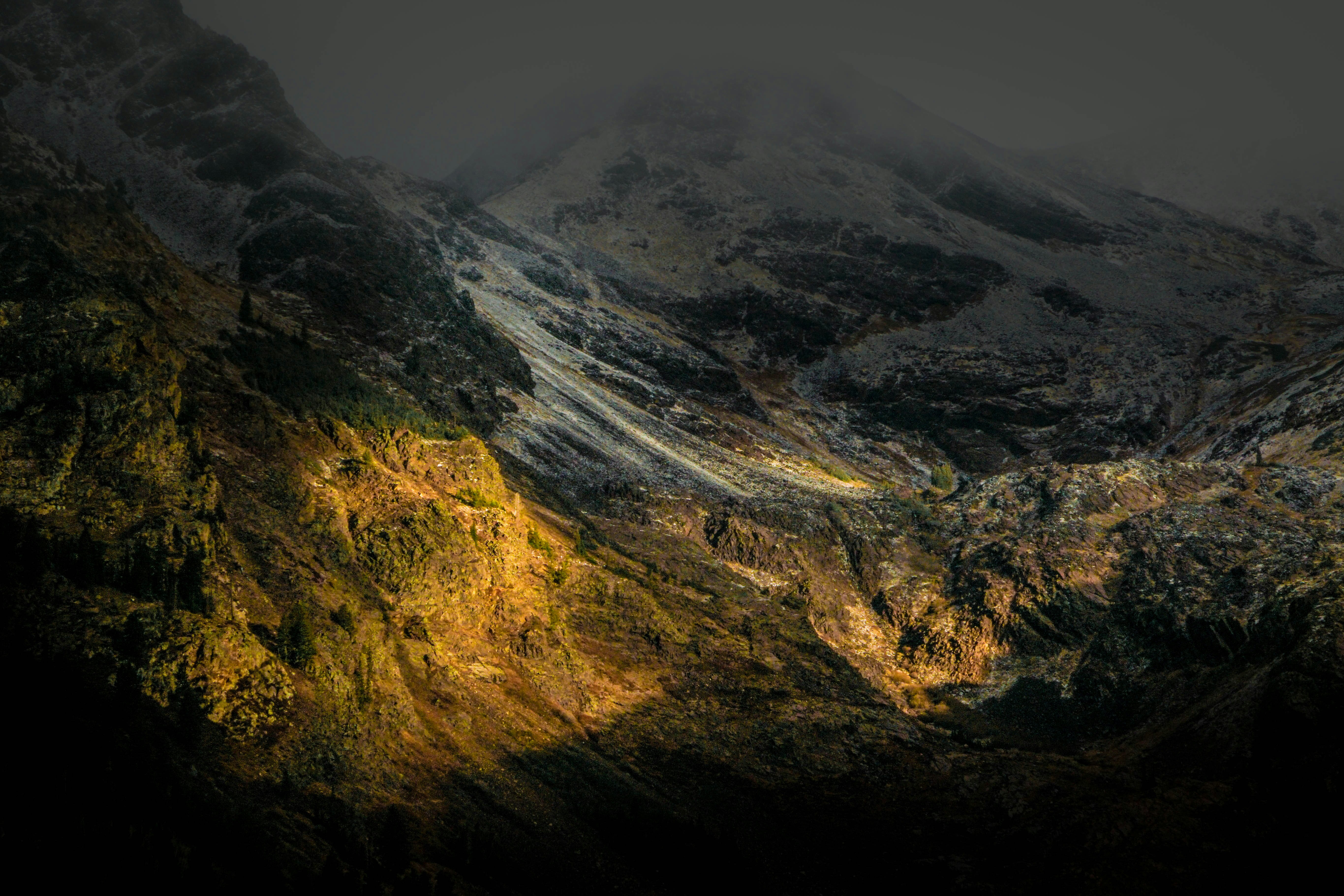Sunlit Ridge: A Portrait of Terraced Light on a Mountain Spine