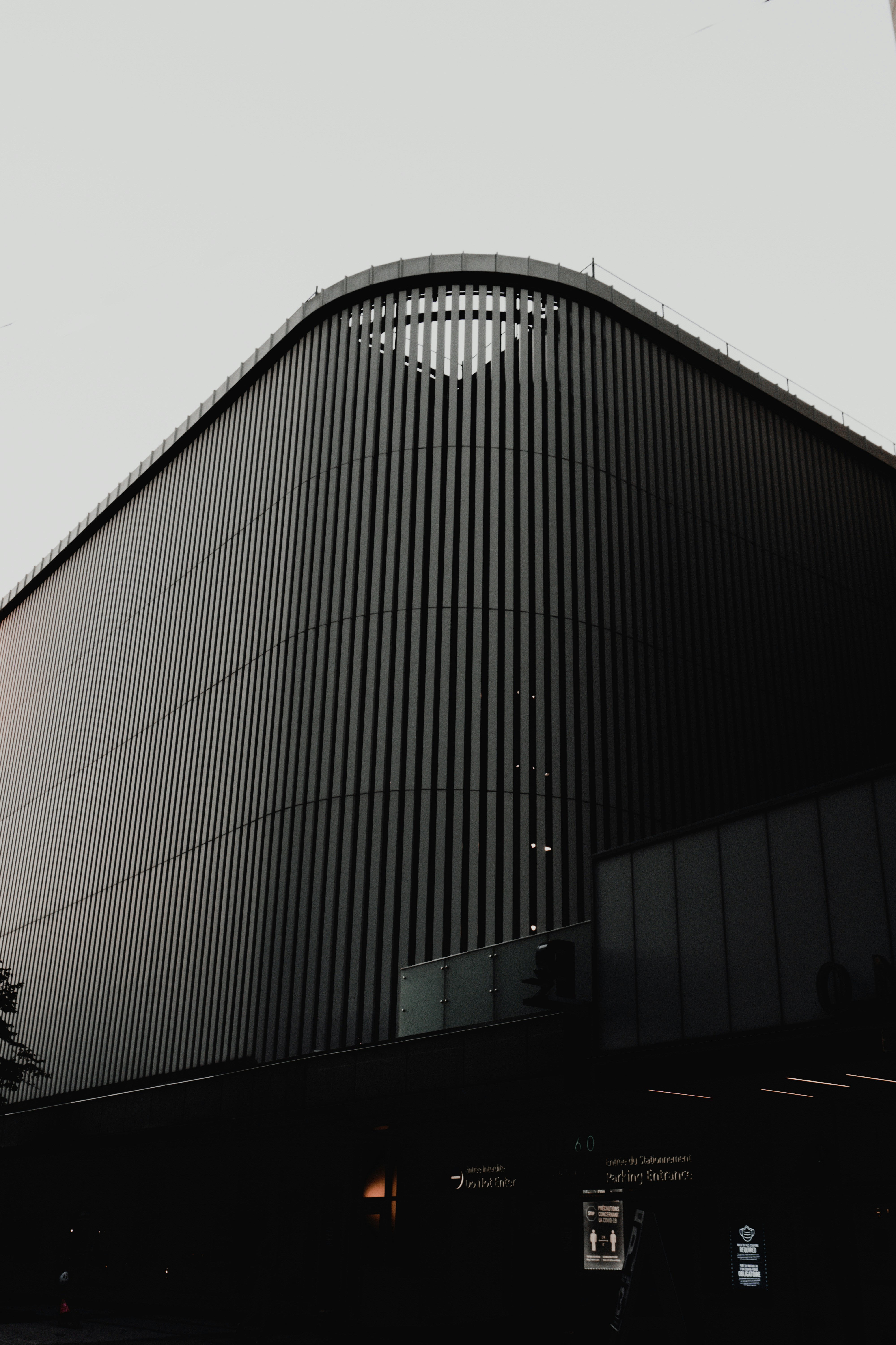 Heart at the Crest: The Quiet Geometry of a Slatted Facade