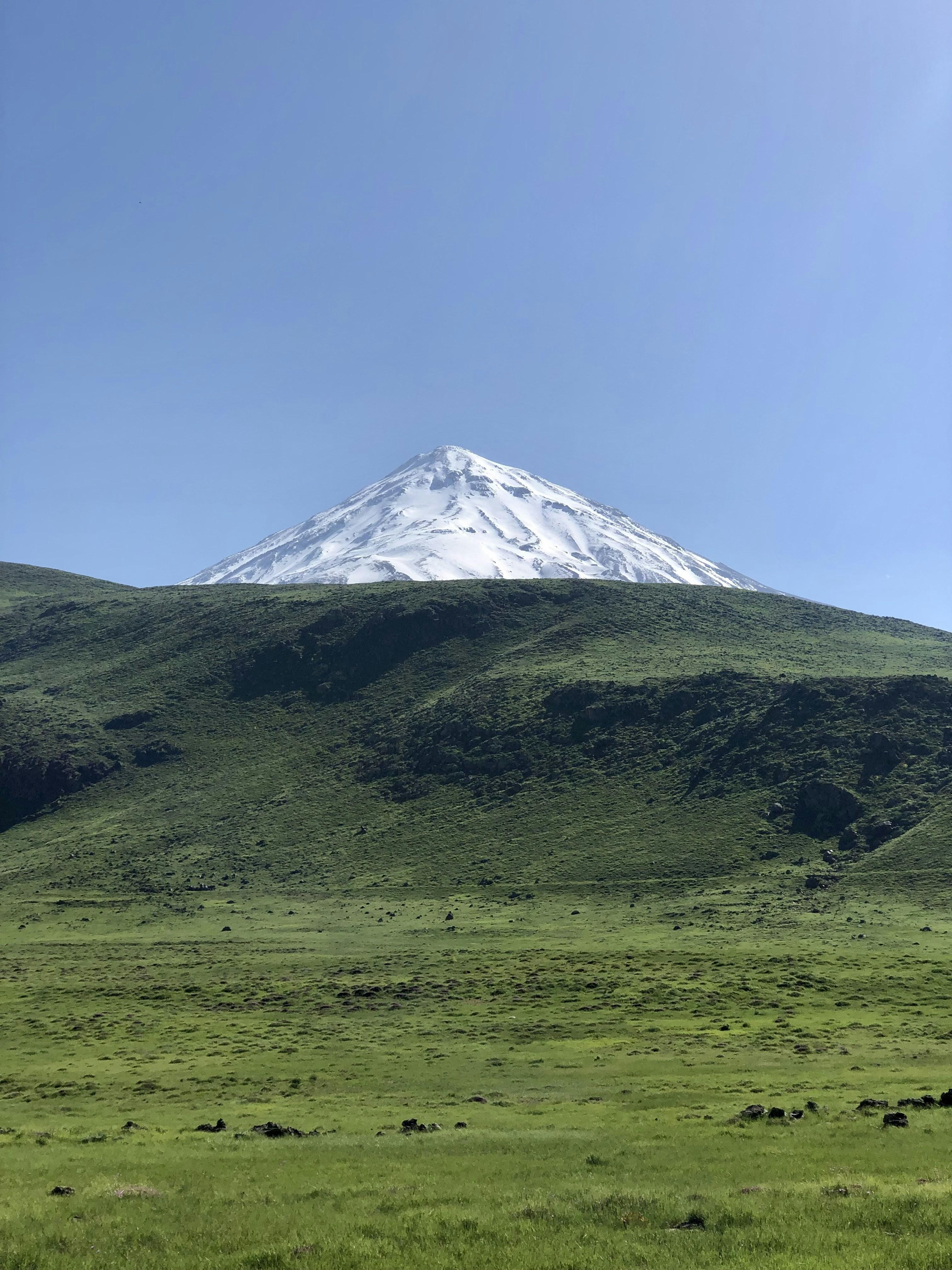 Damavand peak | a mountain with a snow capped peak in the distance