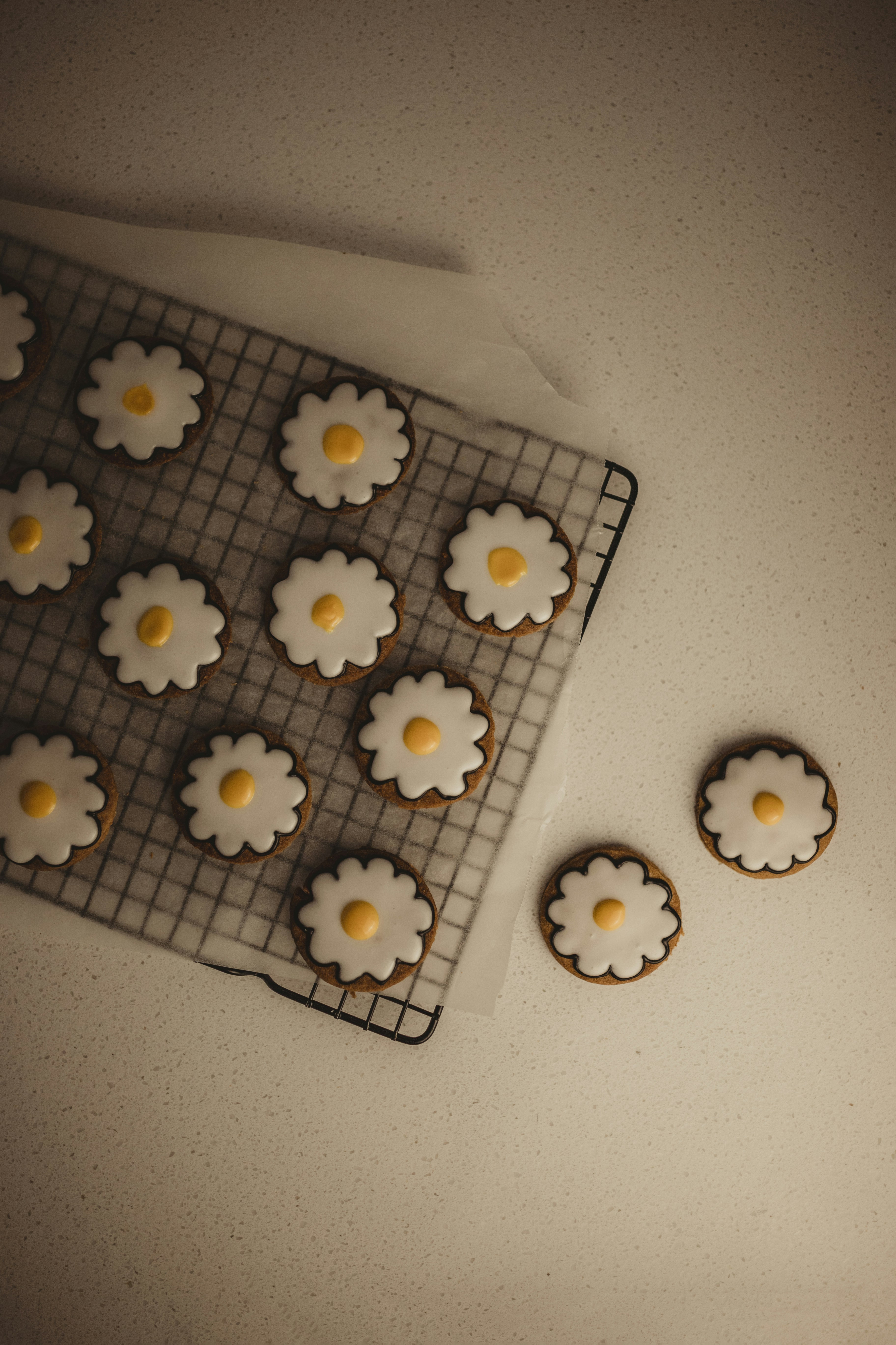 Daisy Cookies on a Warm-Toned Cooling Rack