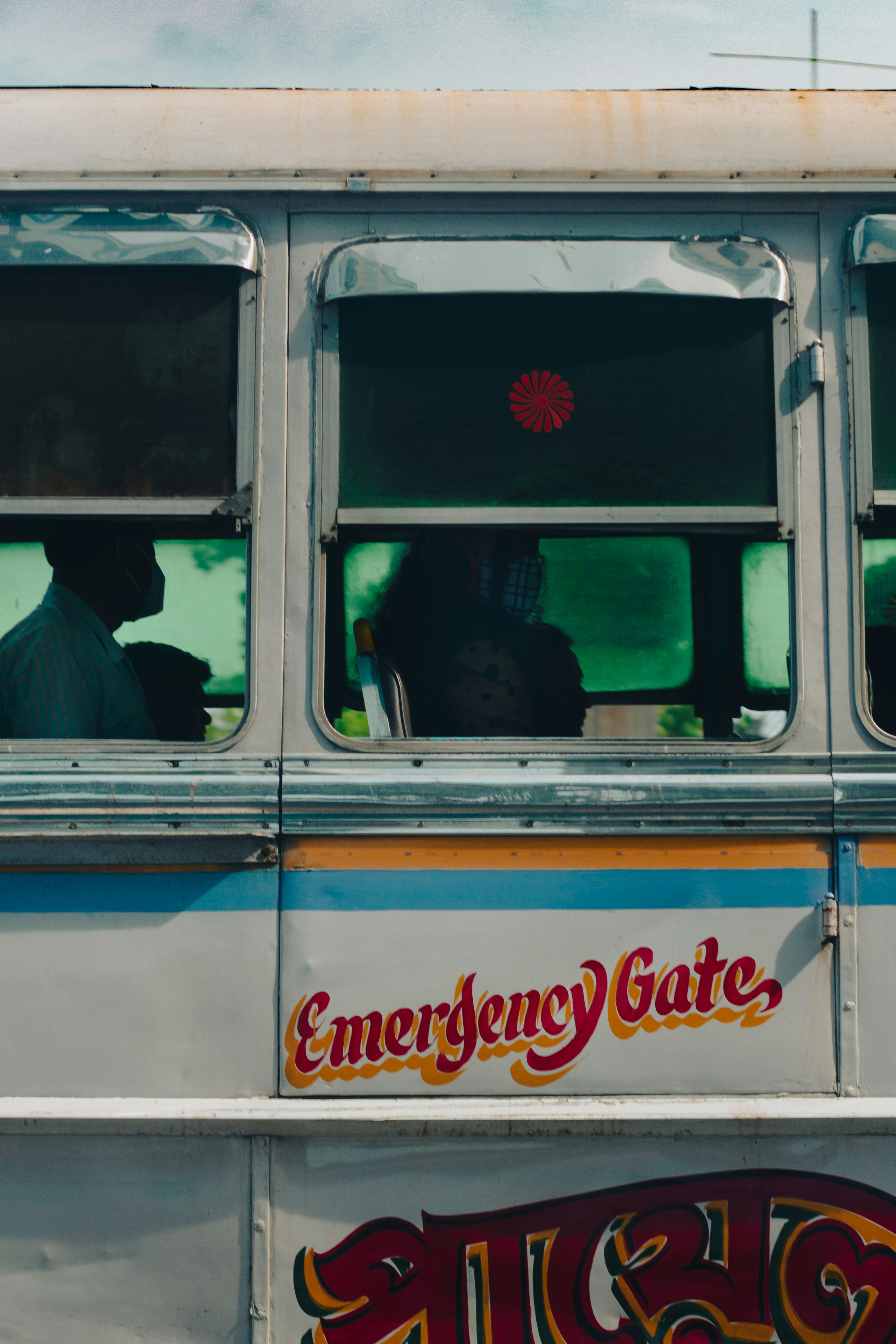 A bus with people sitting inside of it photo – Free Aesthetic wallpaper ...