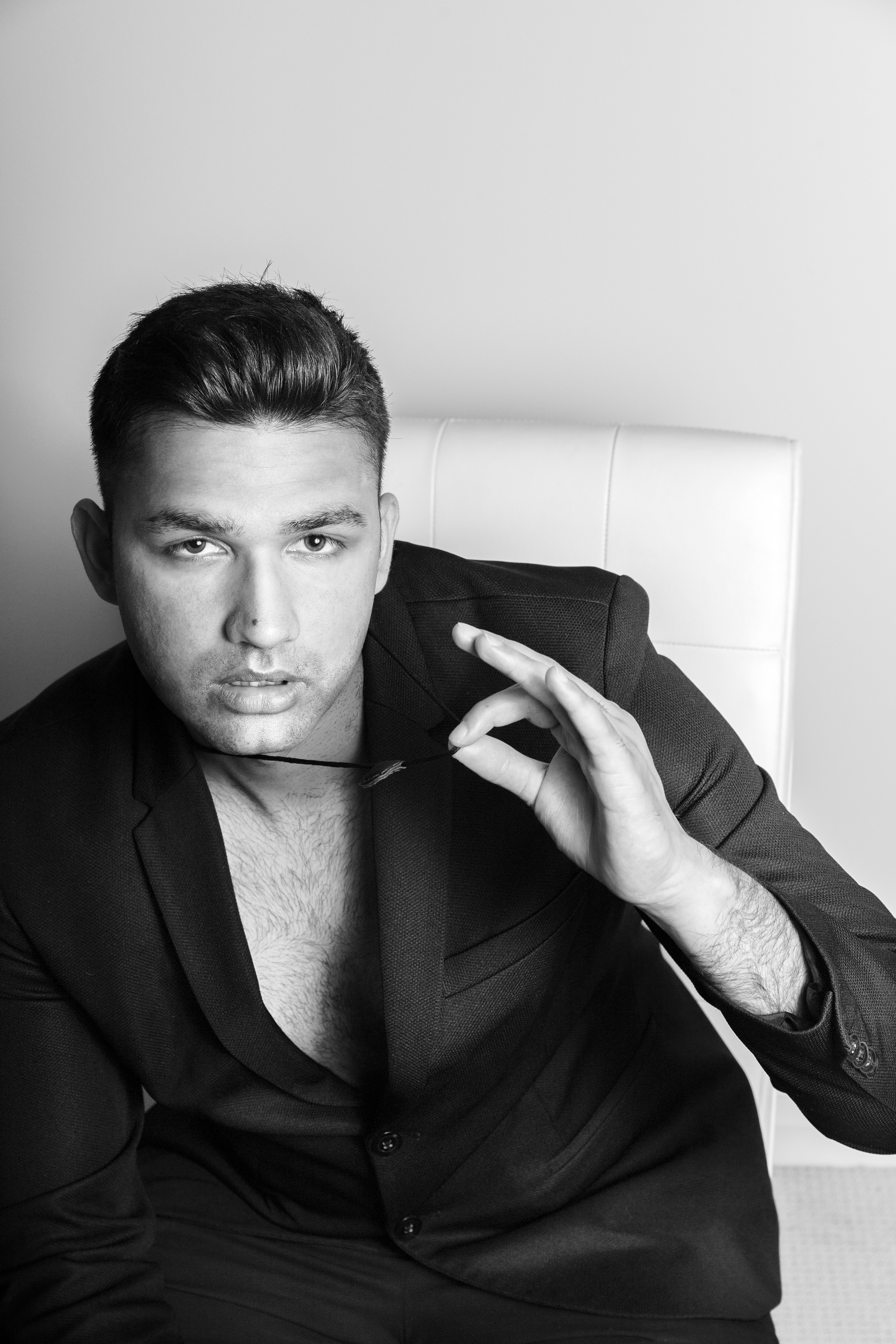 Monochrome Gambit: A poised stare in tailored silhouette