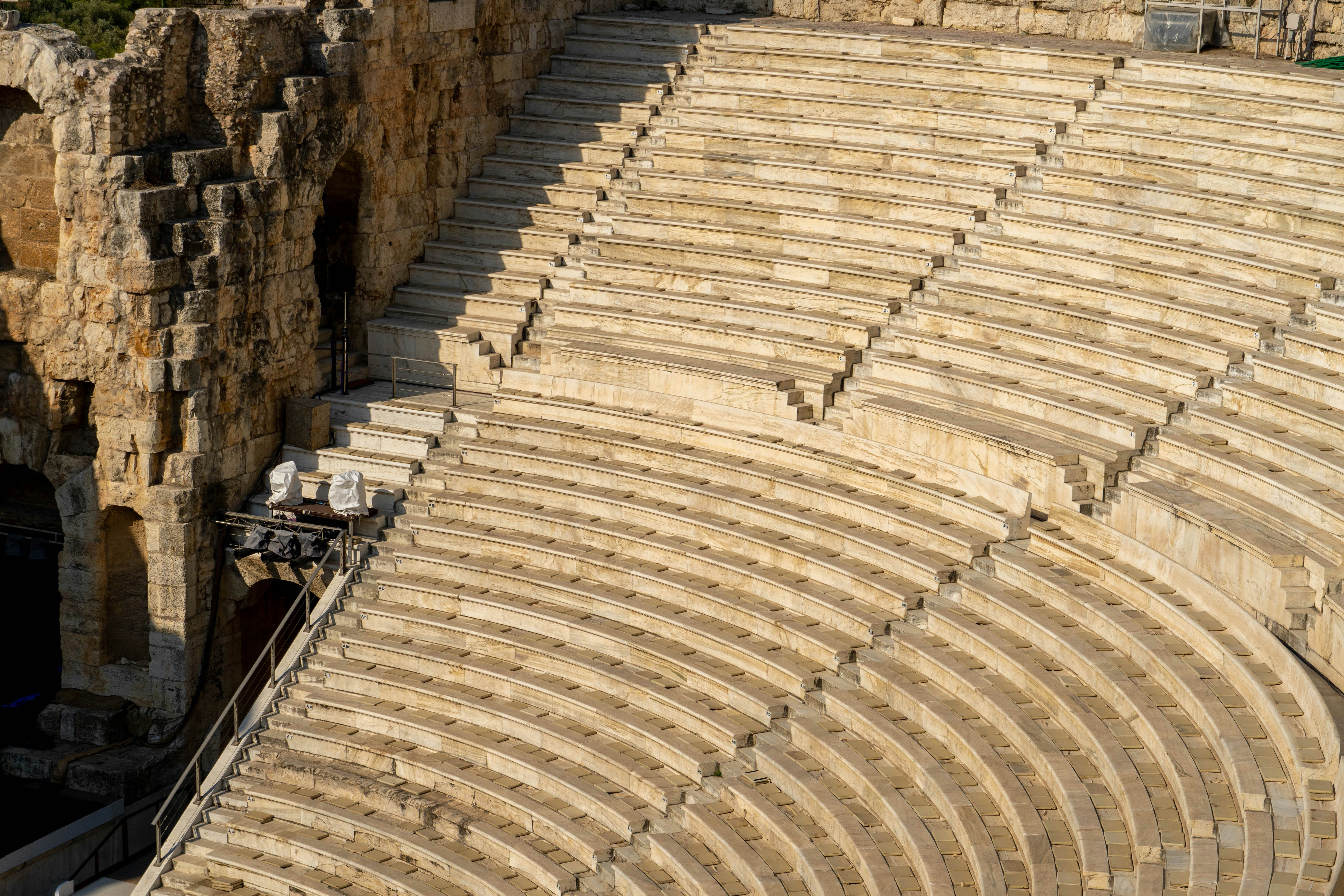 Stone steps of a historic amphitheater, showcasing the architectural grandeur and timeless design of ancient performance spaces.