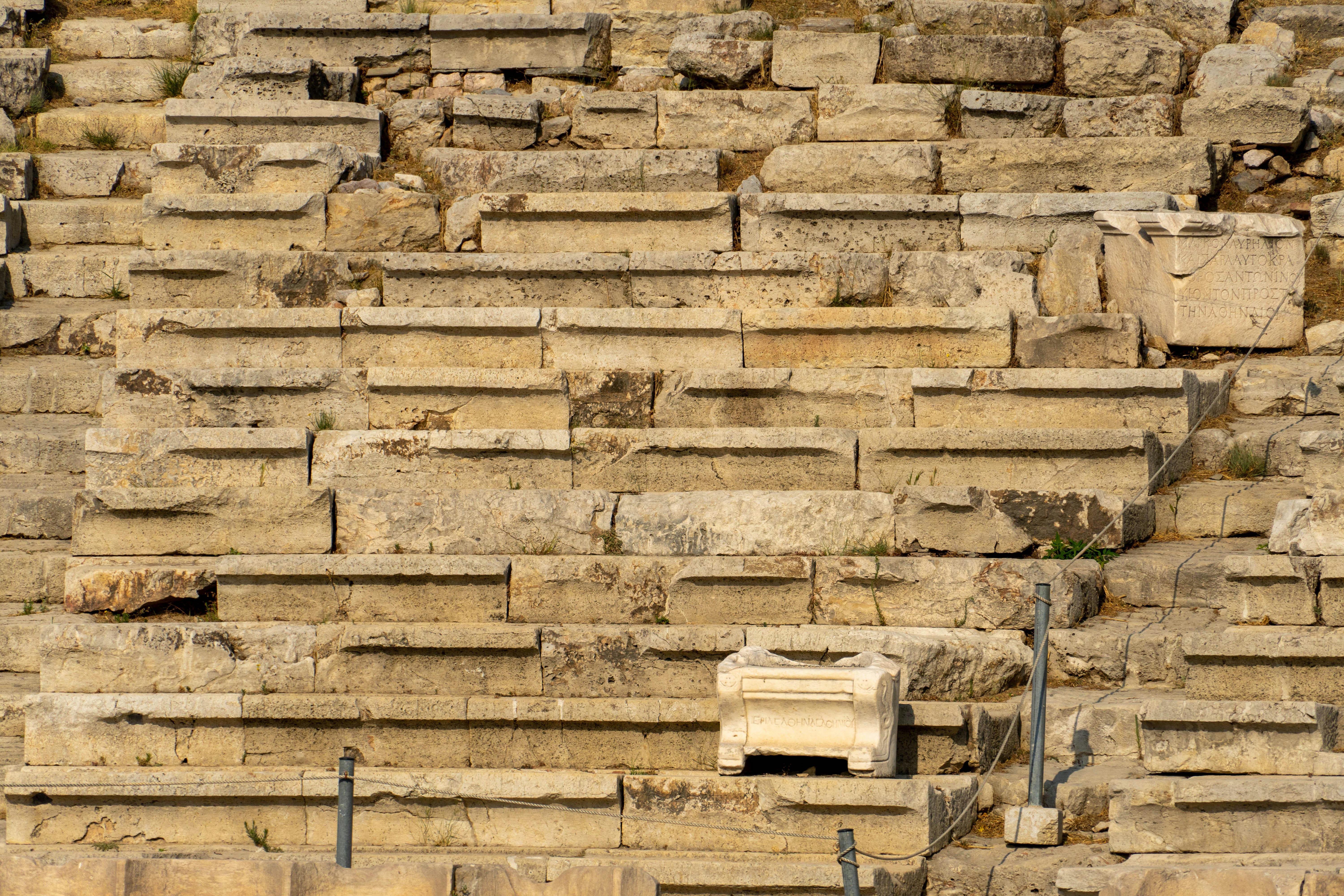 A large pile of stone blocks sitting next to each other photo – Free ...