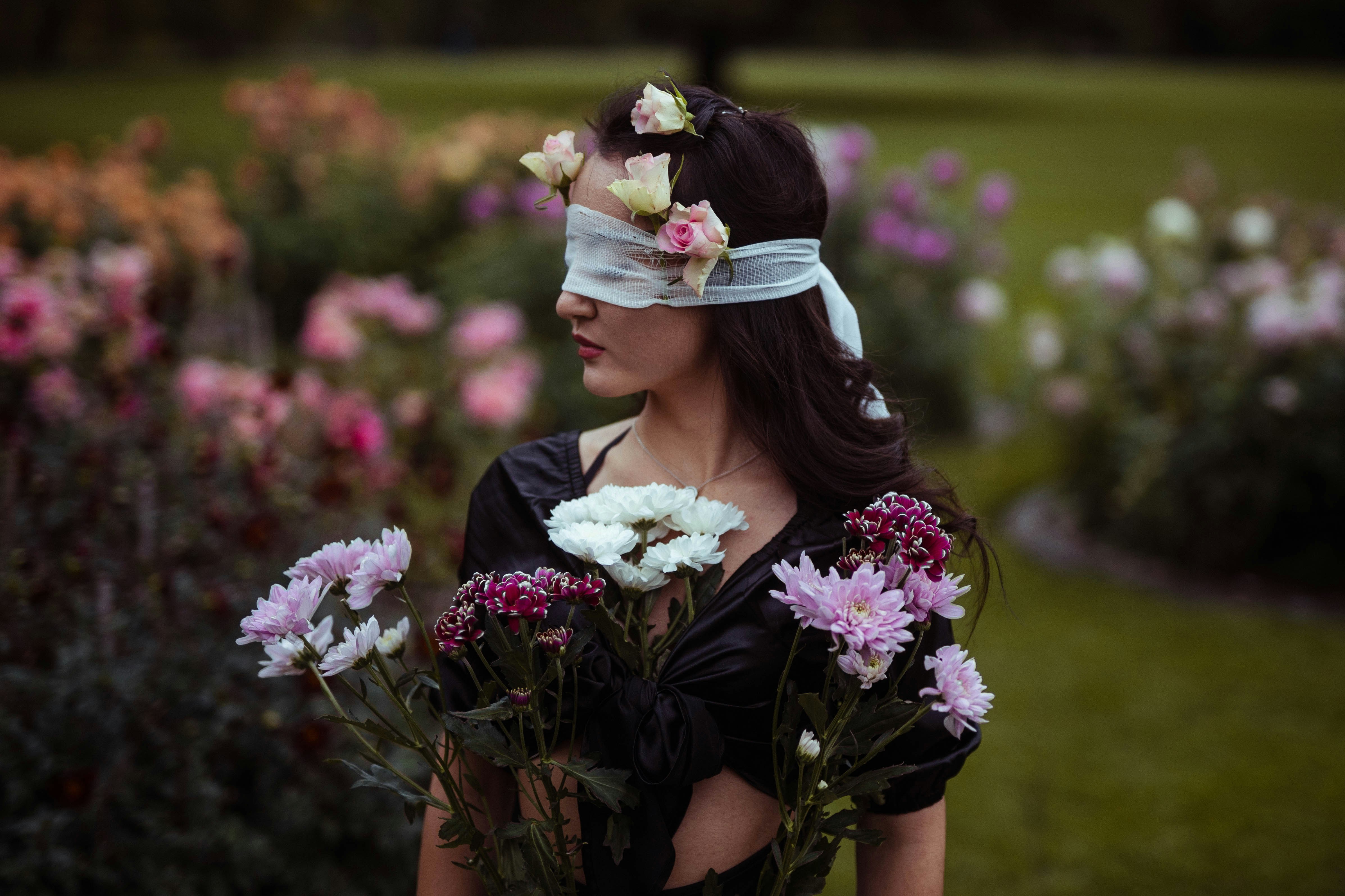 Blindfolded Bloom: A Portrait in Garden Quiet