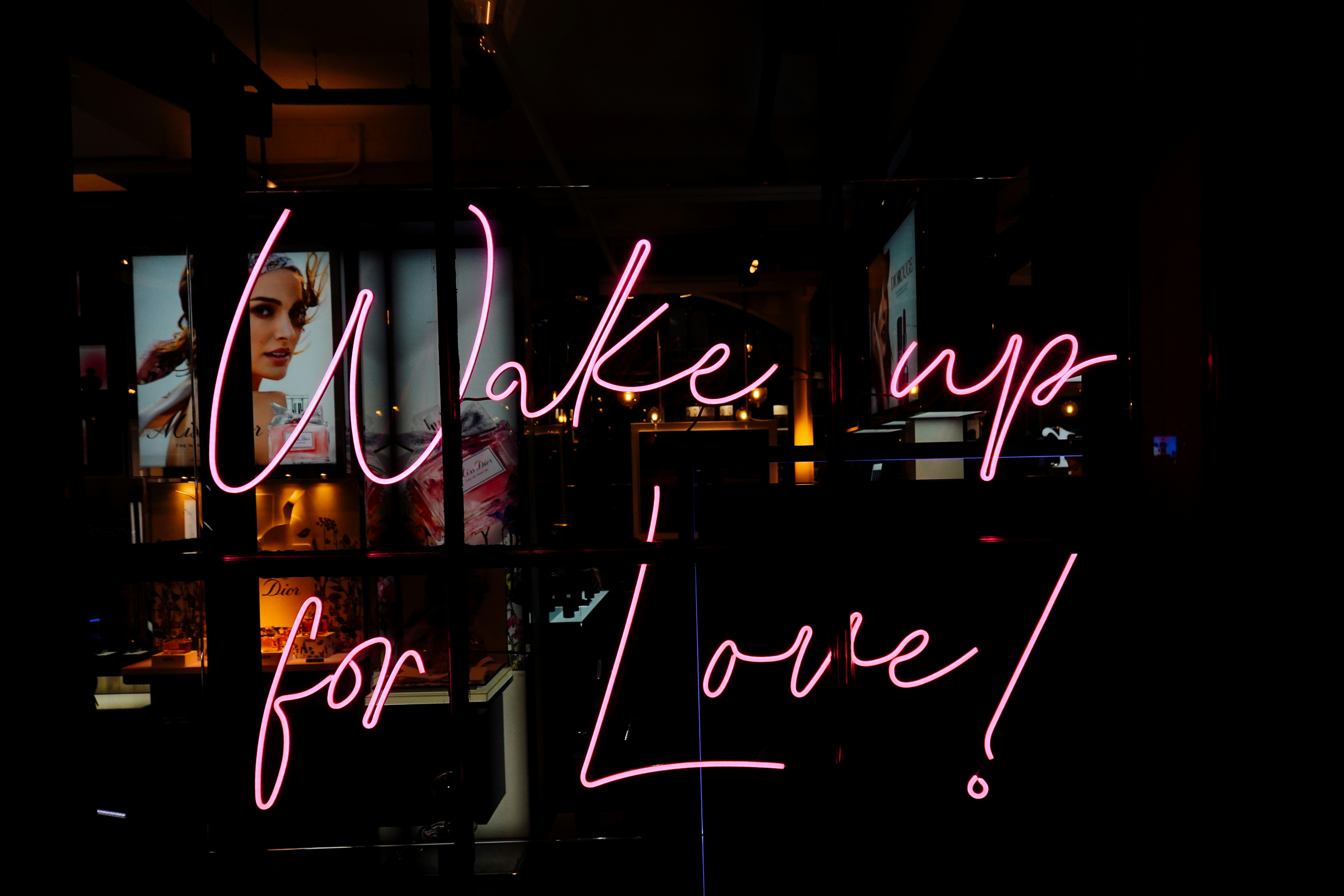 Midnight Neon Script: Wake Up for Love in a Glass Shopfront