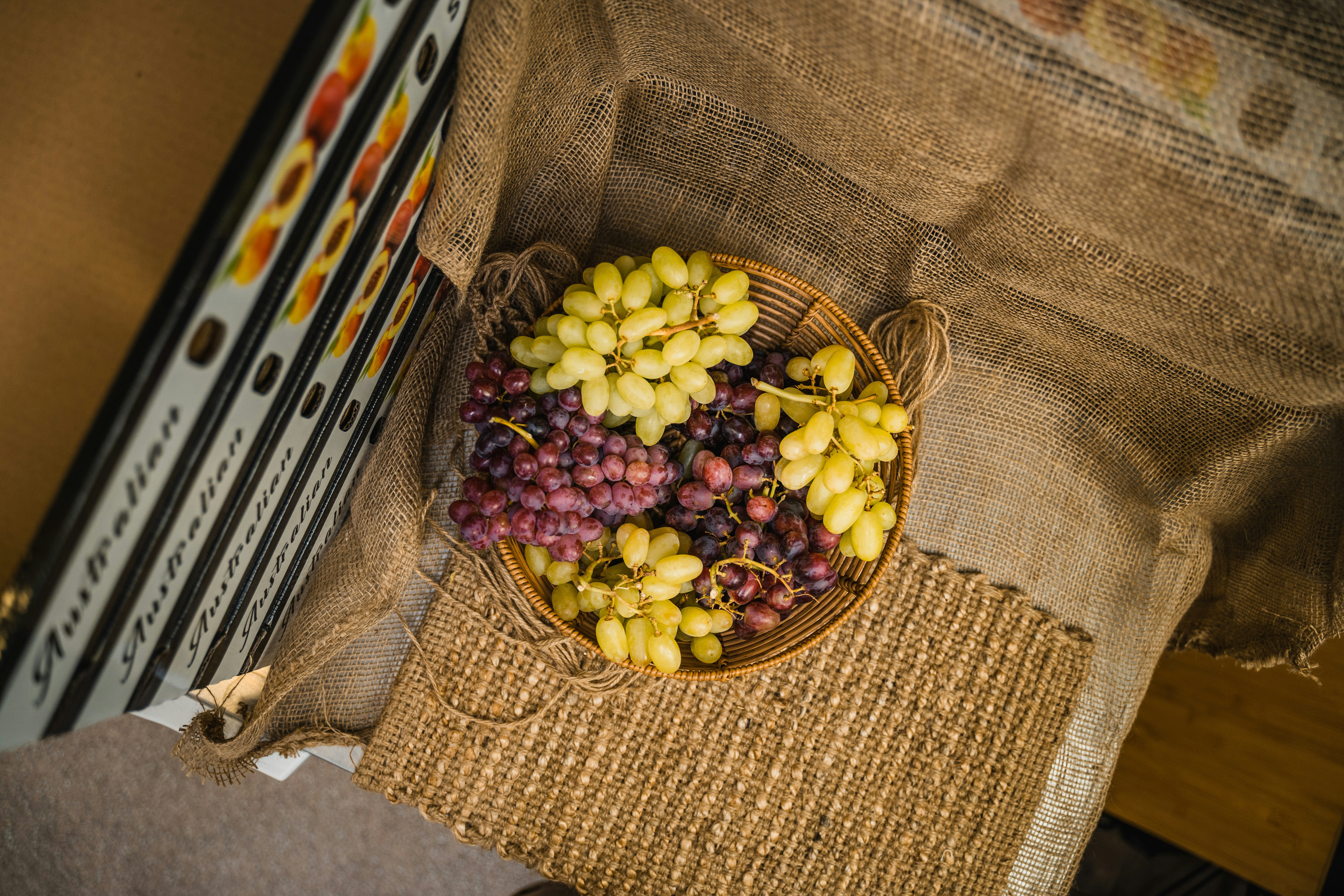 Golden and Purple Grapes in a Rustic Burlap Still Life