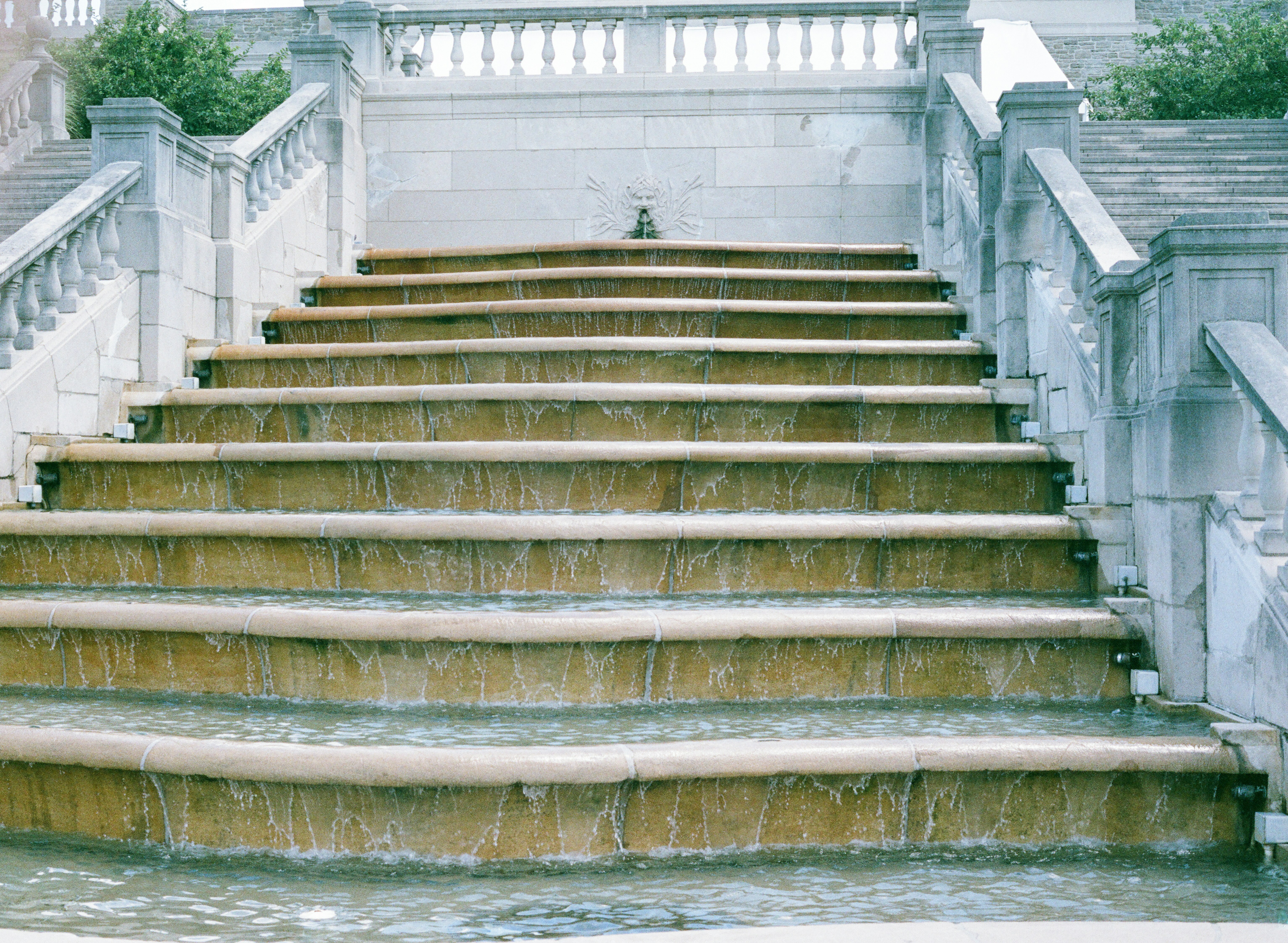 A bunch of steps that have water running down them photo – Free ...