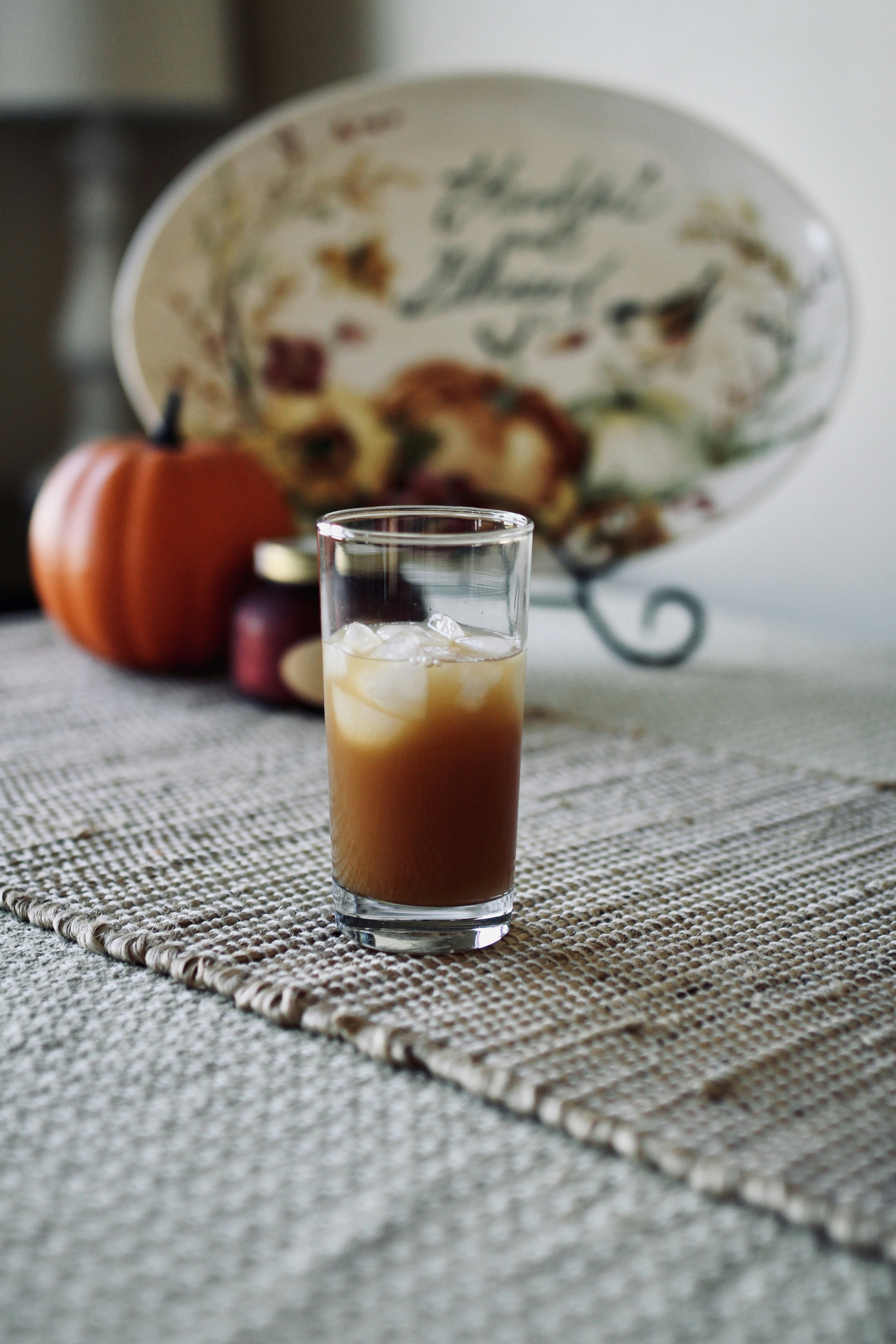 Cold Brew on Linen: An Autumn Still-Life with Pumpkin Glow