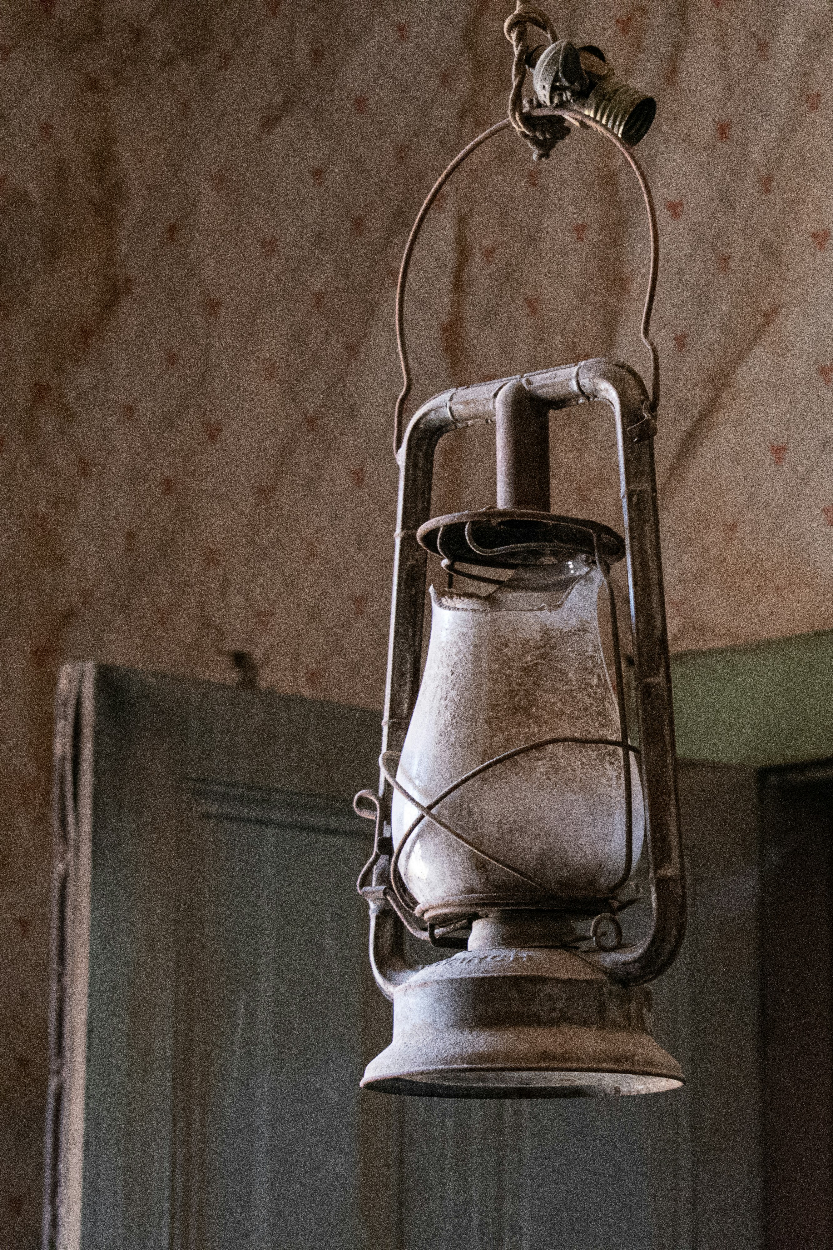 Dusty Lantern in a Quiet Abandoned Room