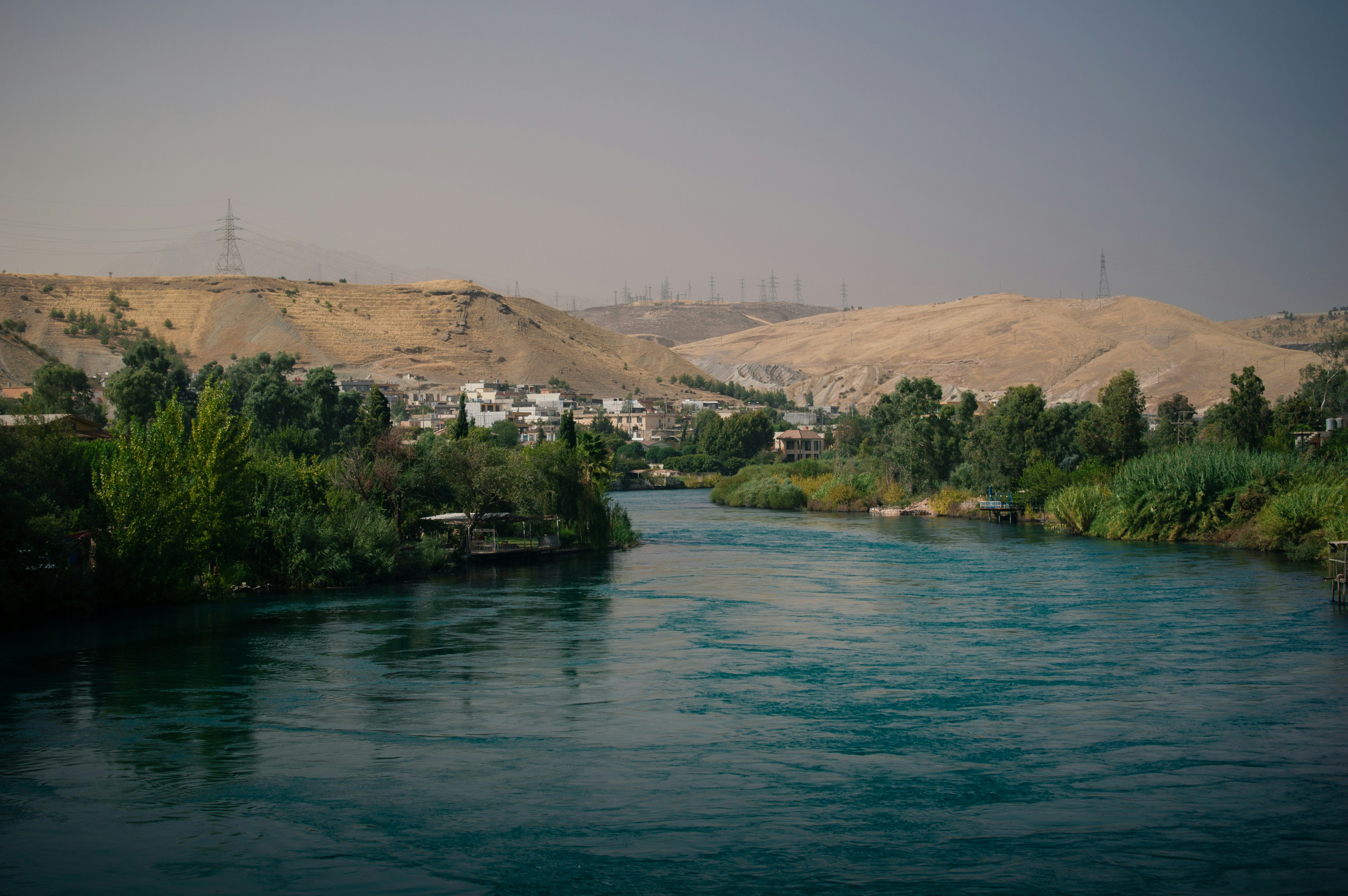Riverside Village Framed by Turquoise Waters and Desert Hills