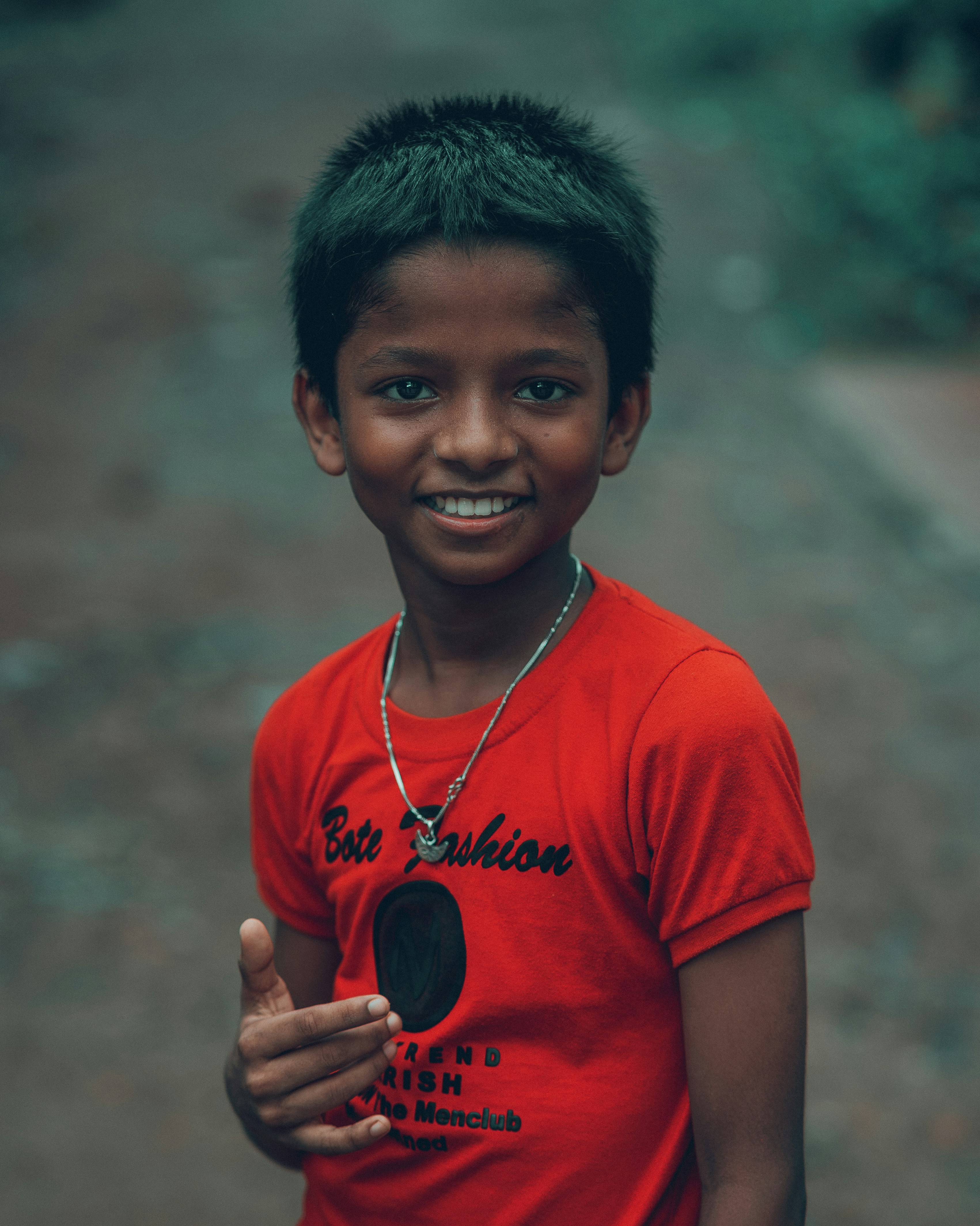 A young boy is giving the thumbs up sign photo – Free Human Image on ...