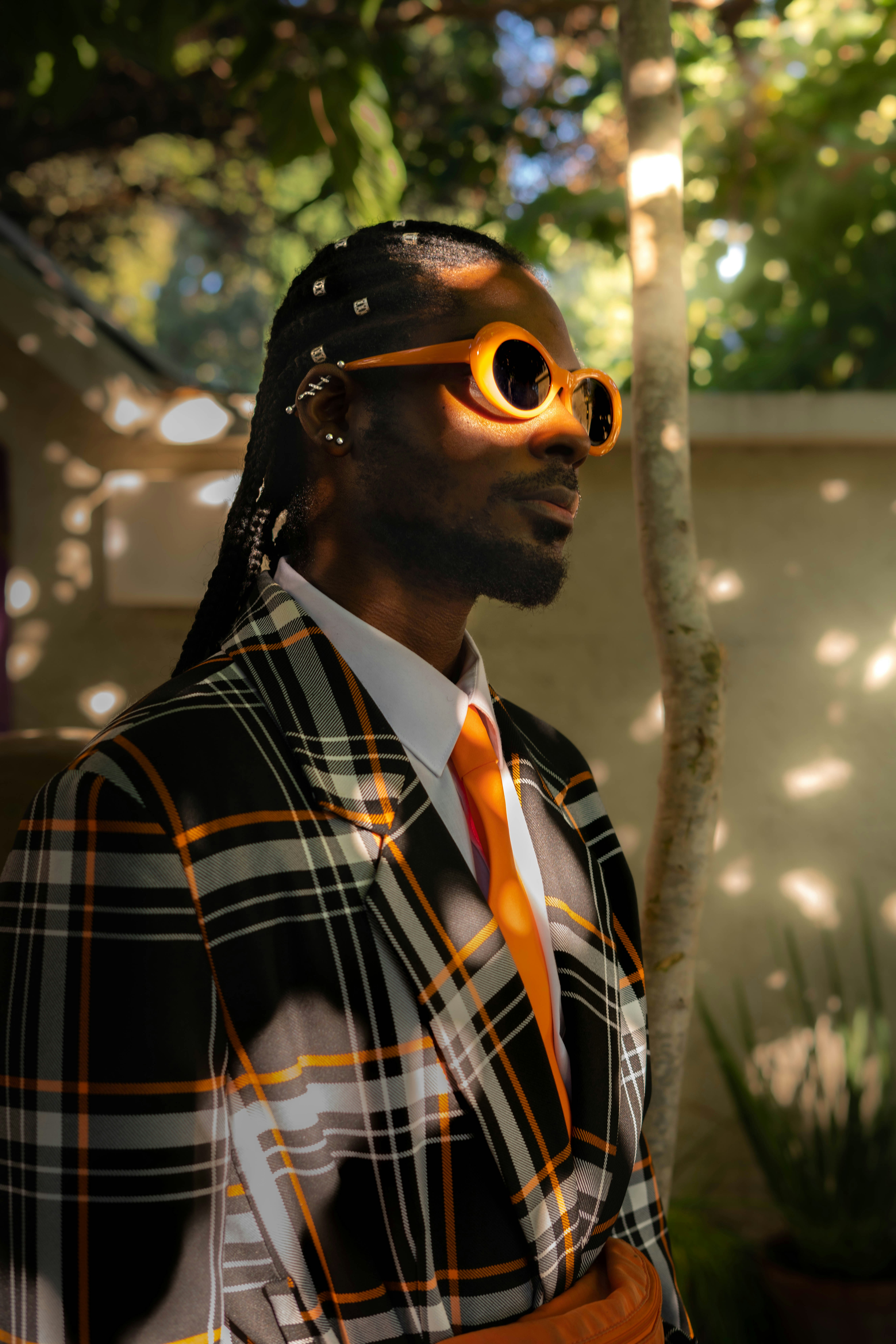 Plaid Power and Orange Frames in Dappled Summer Light