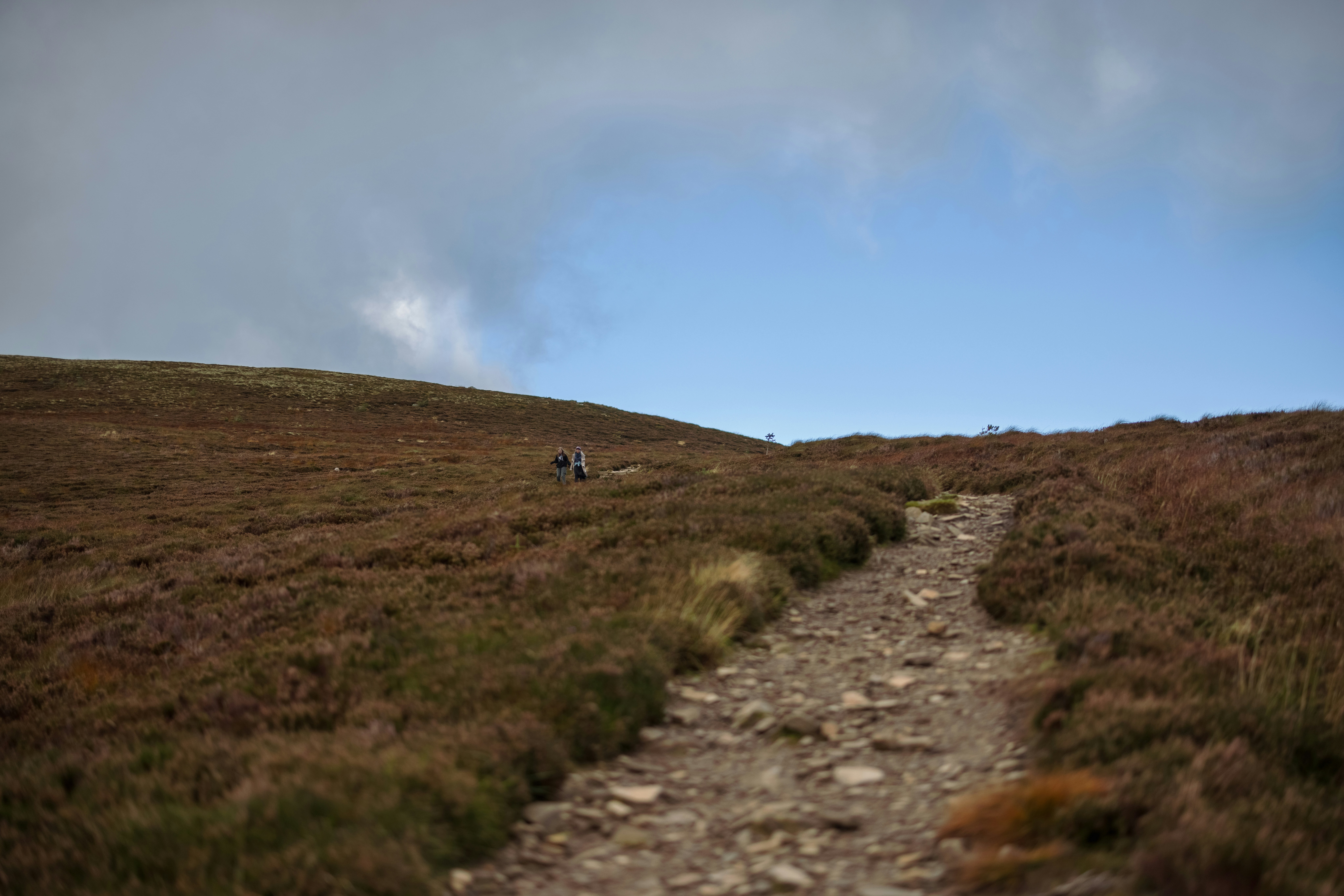 A trail going up a hill with a person on it photo – Free Uk Image on ...