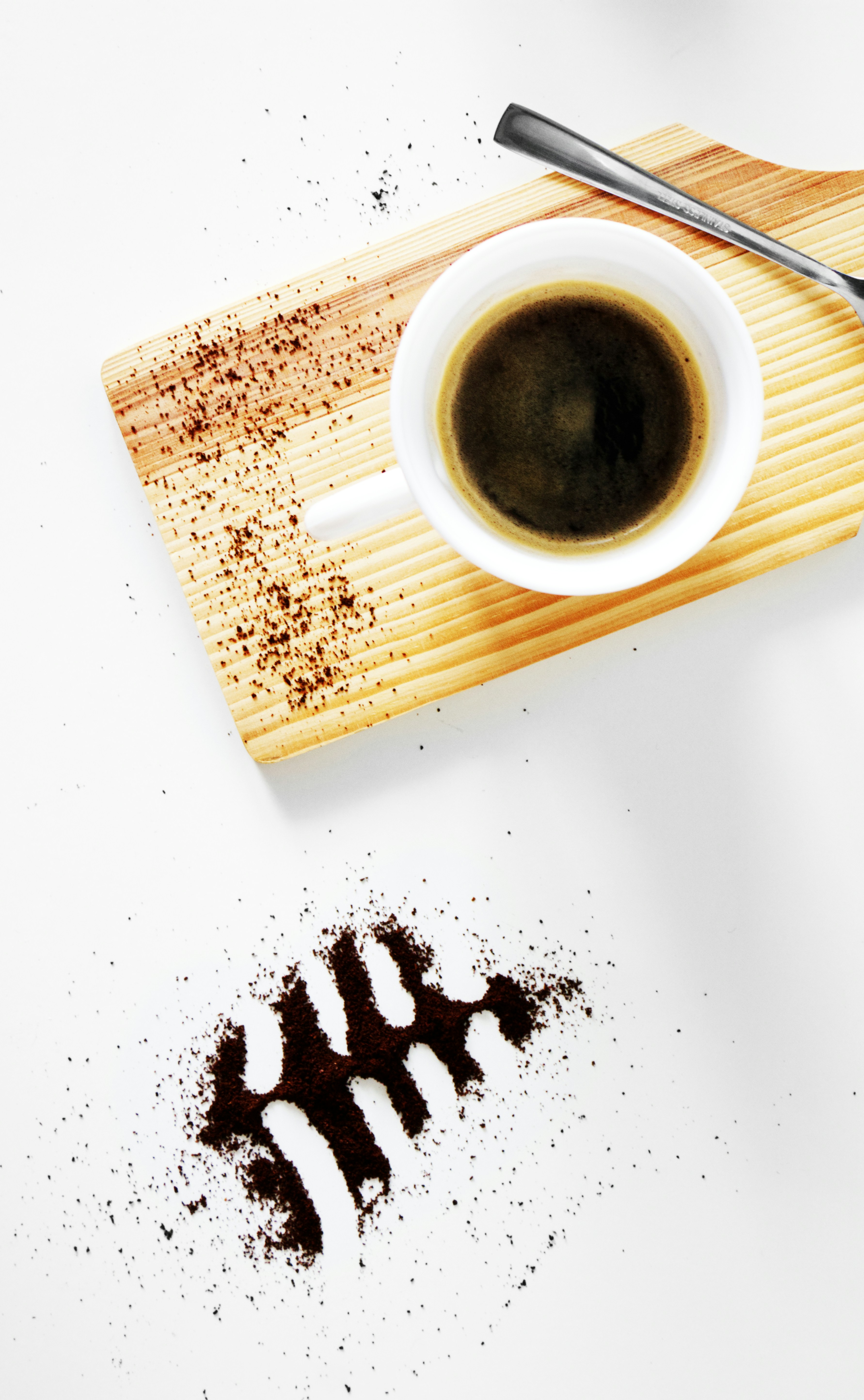 Cup of Dark Wisdom: A Minimal Coffee Scene on a Wooden Plank