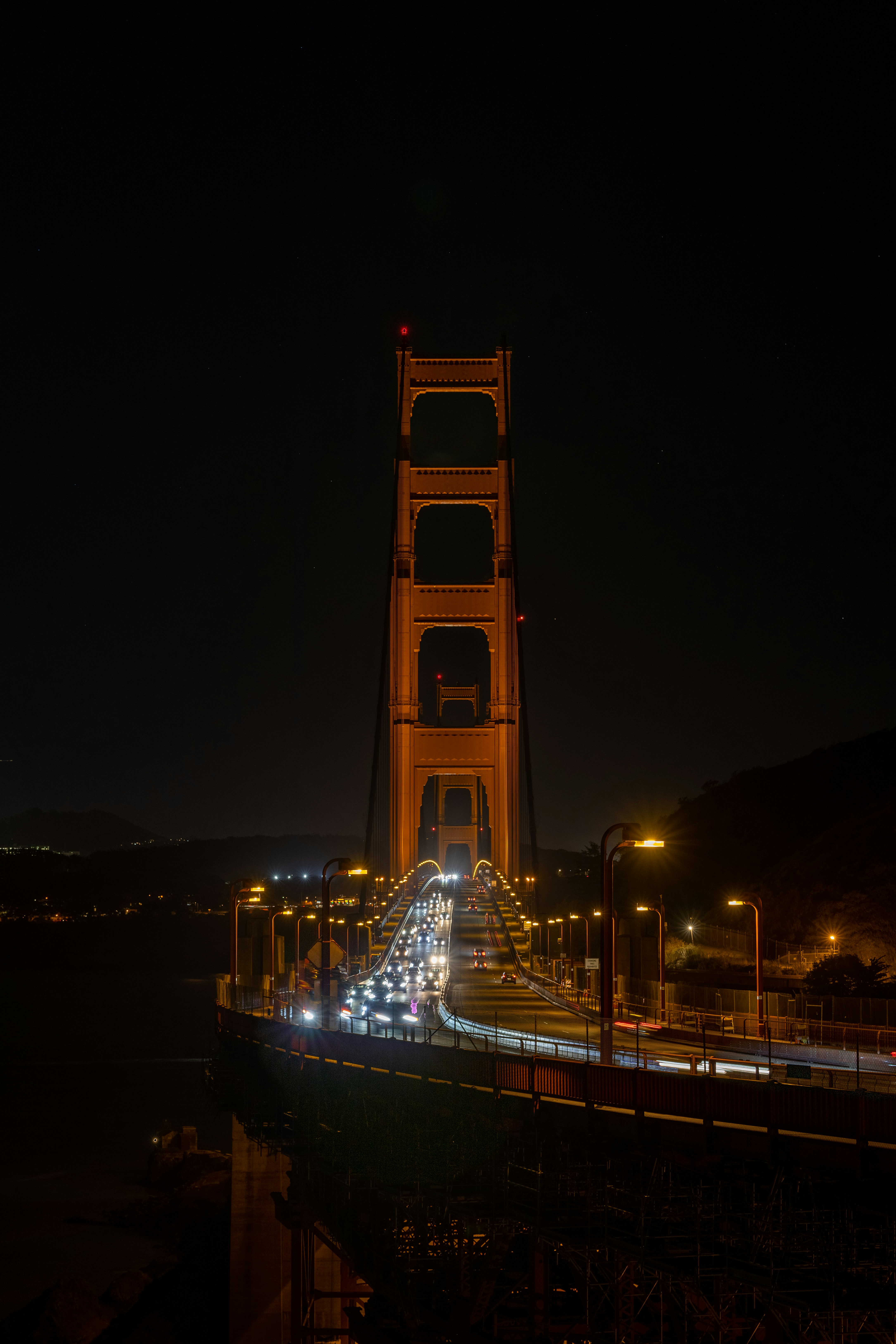 A very tall bridge with a bunch of lights on it photo – Free Wallpaper ...