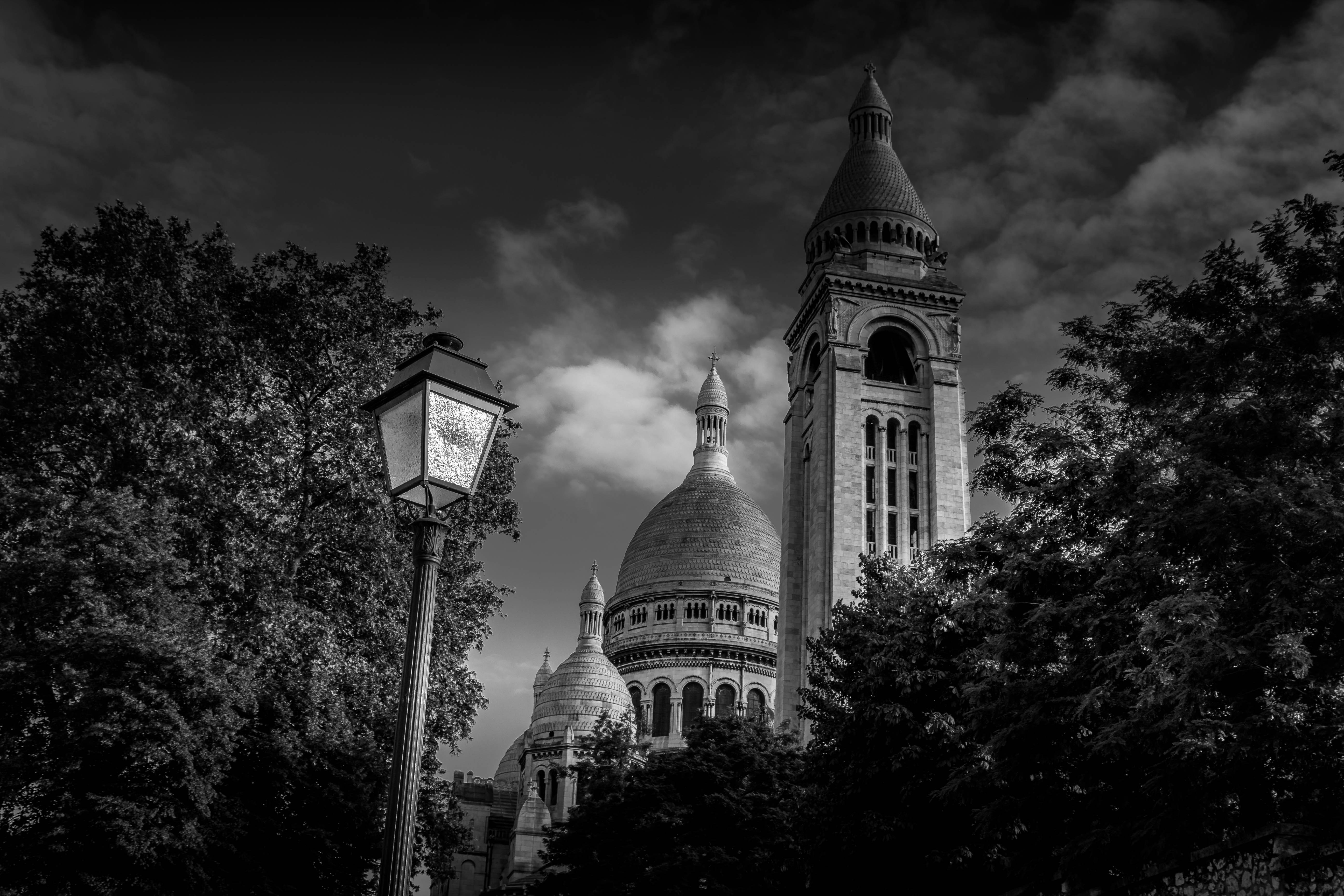 a black and white photo of a church with a clock towerMatt Pictures