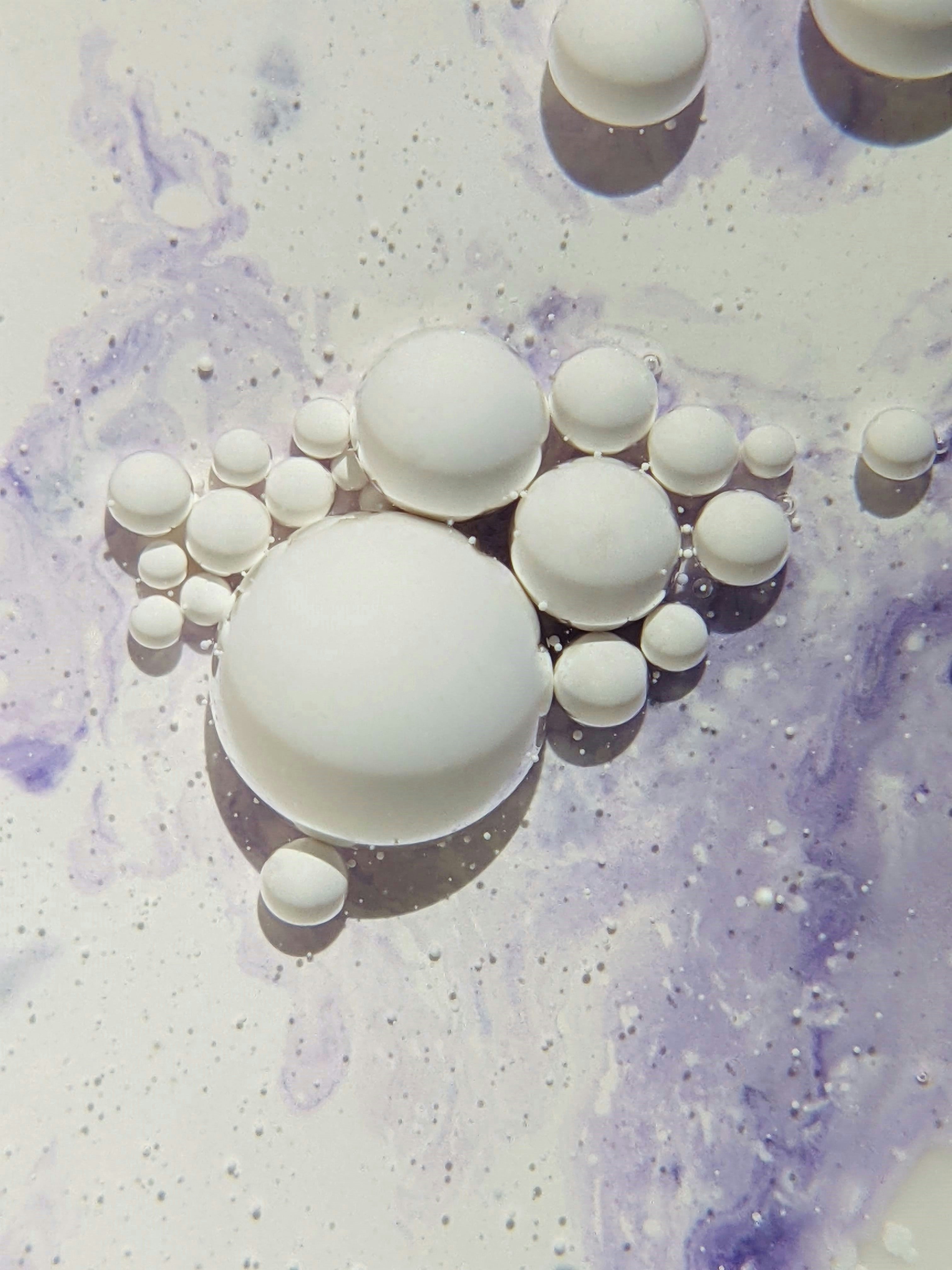 Oil-and-Gas Bubbles: A Cosmic Cluster on Lavender Canvas