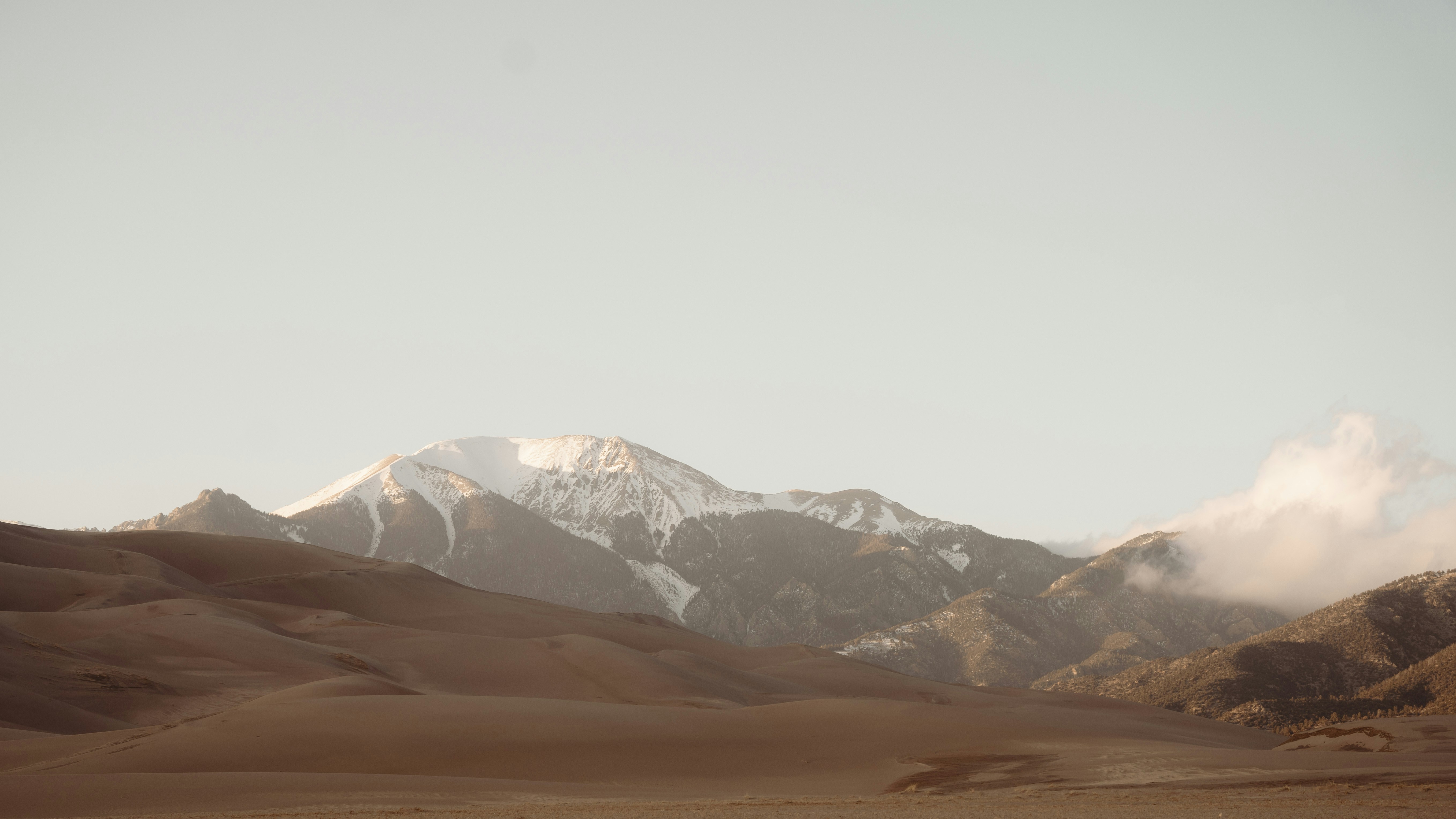The mountains are covered with snow in the desert photo – Free Great ...