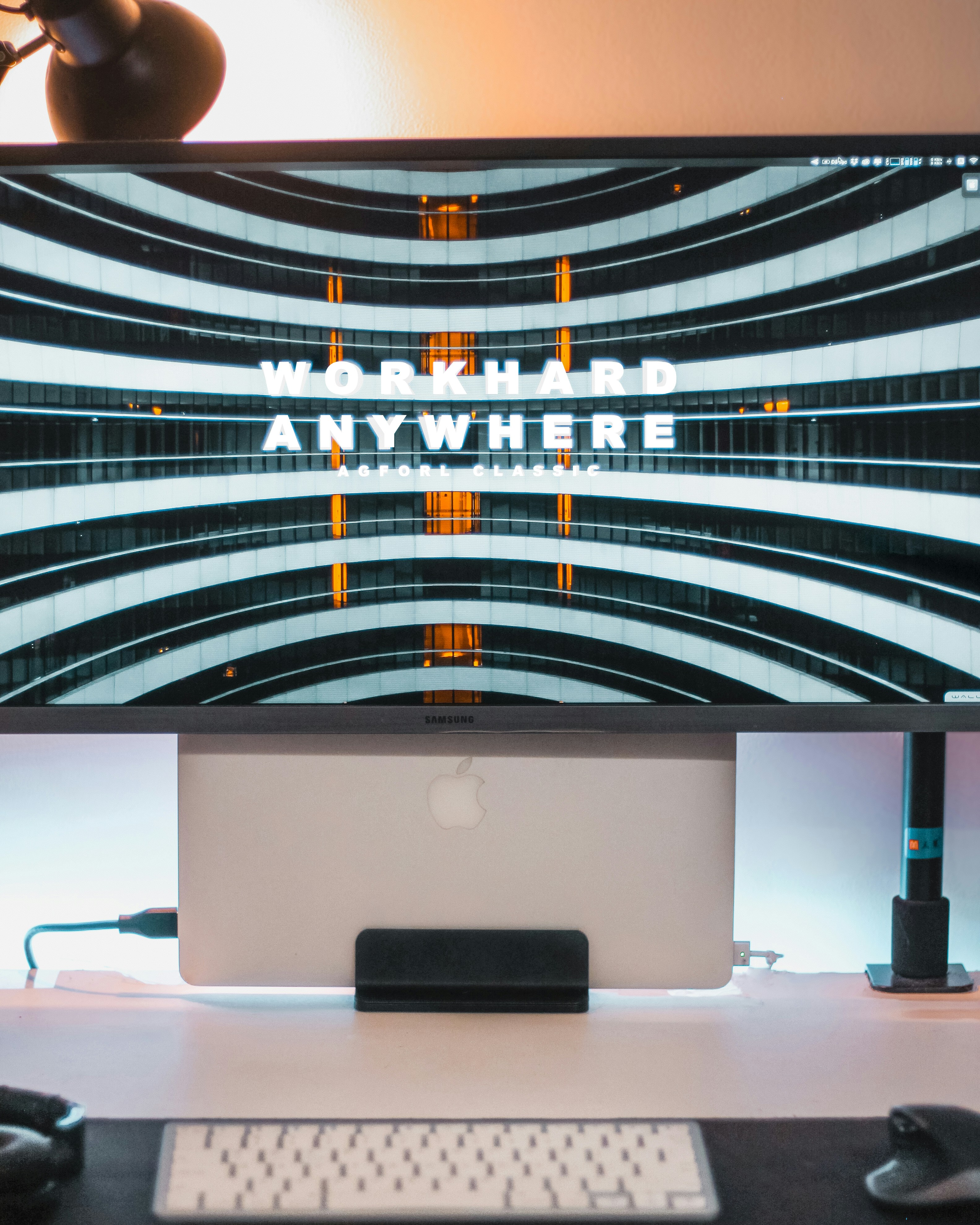 Work Hard Anywhere: A Minimal Mac Setup Illuminated by Screen Glow
