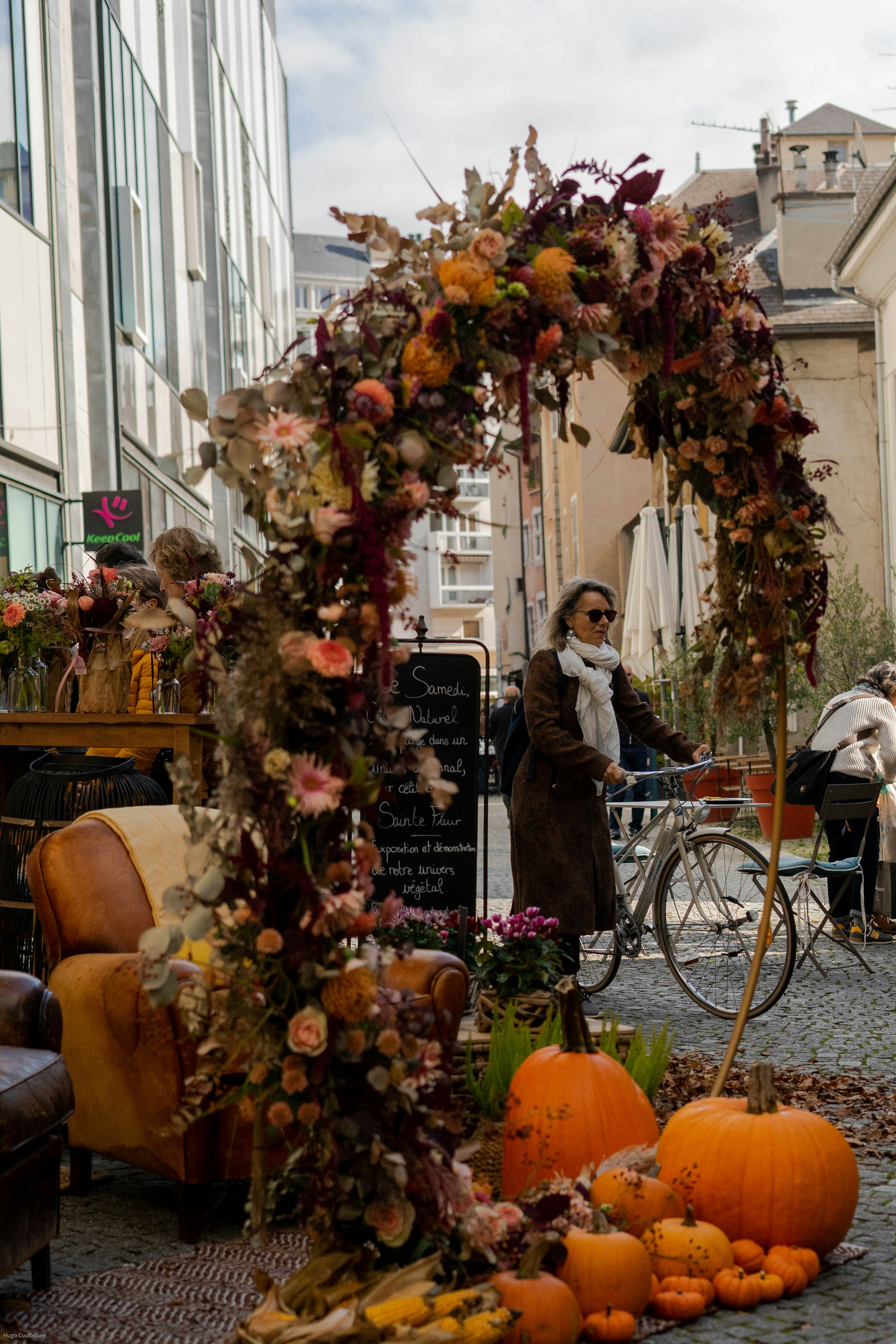 Autumn Harvest Arch: Florals Framing a City Street Moment