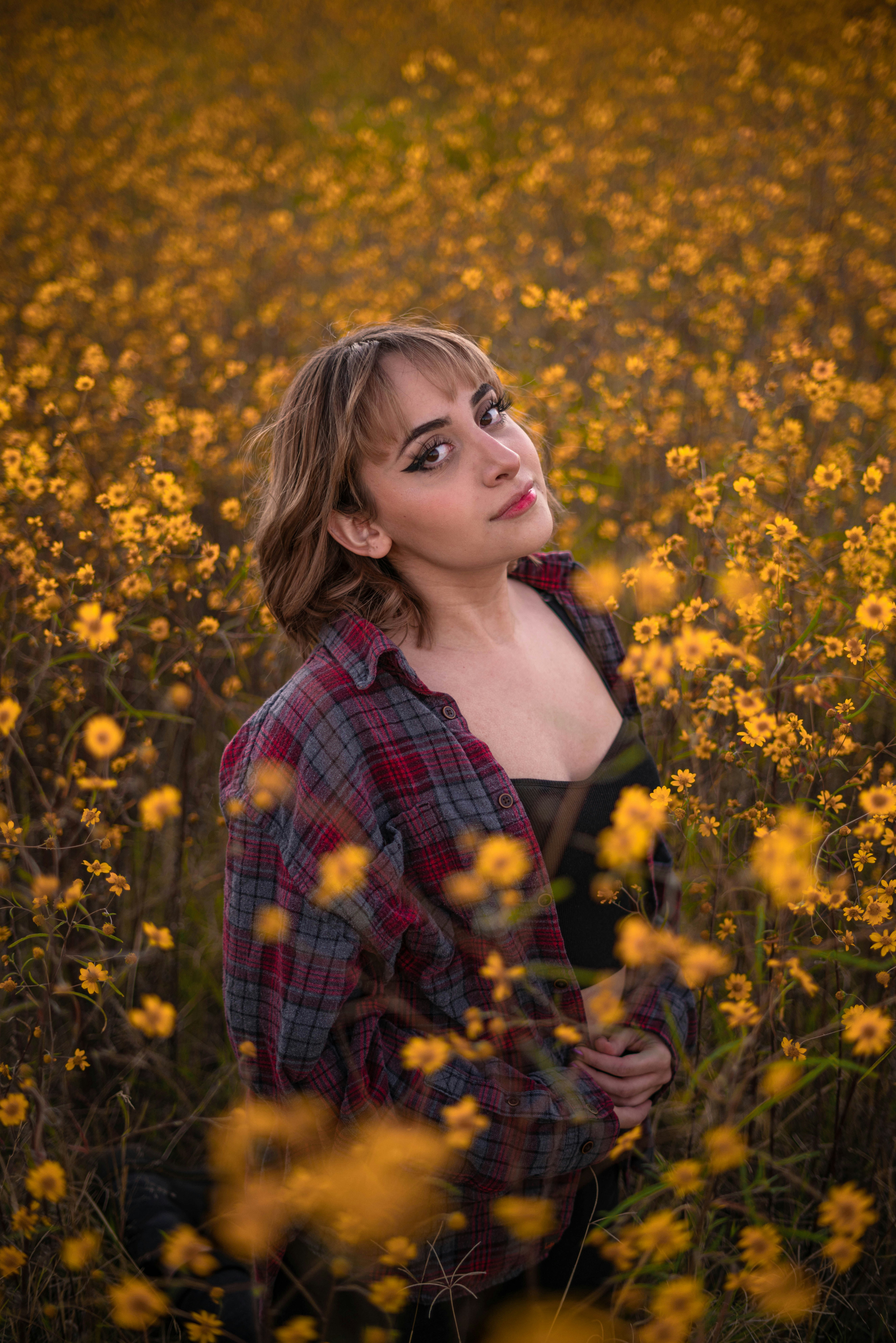 Golden Quiet: A Portrait Beneath Saffron Blossoms