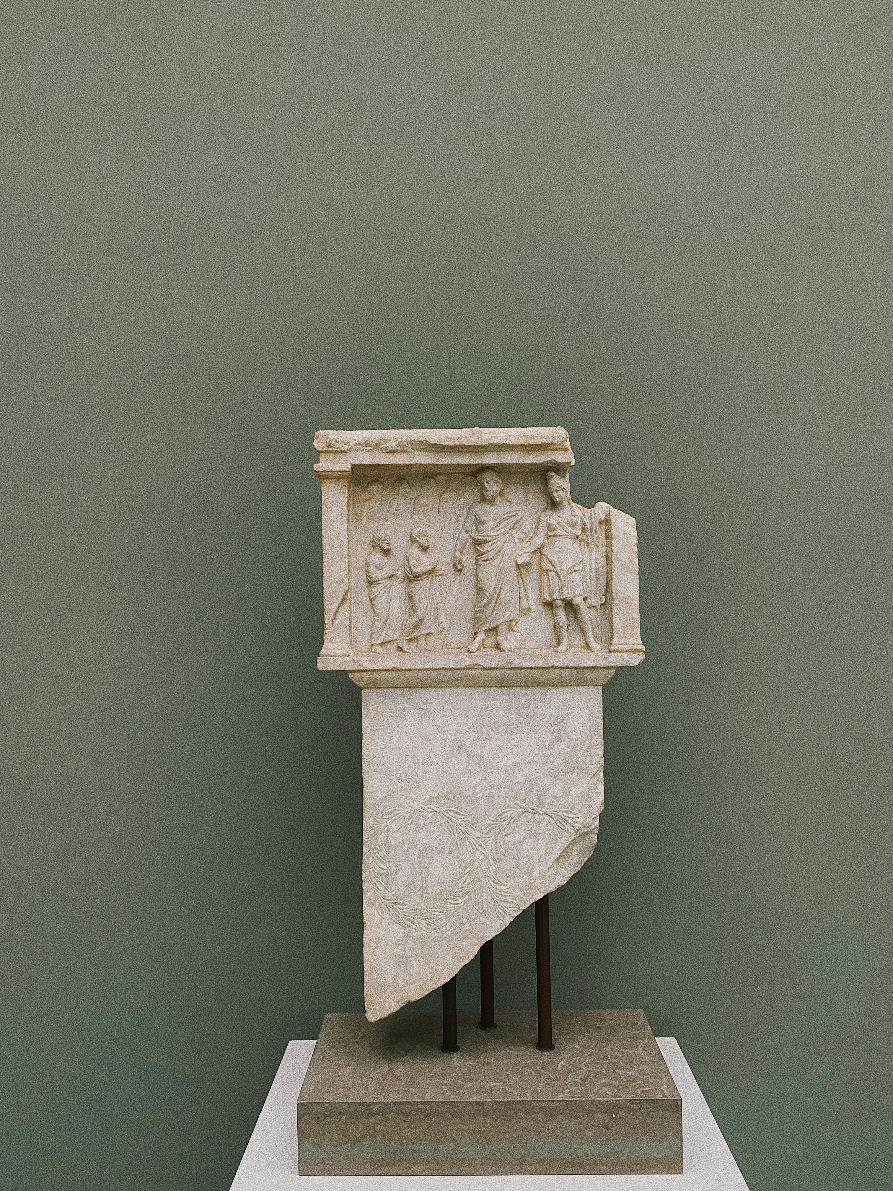 A sculpture of a rectangle with figures on it photo – Free Copenhagen ...