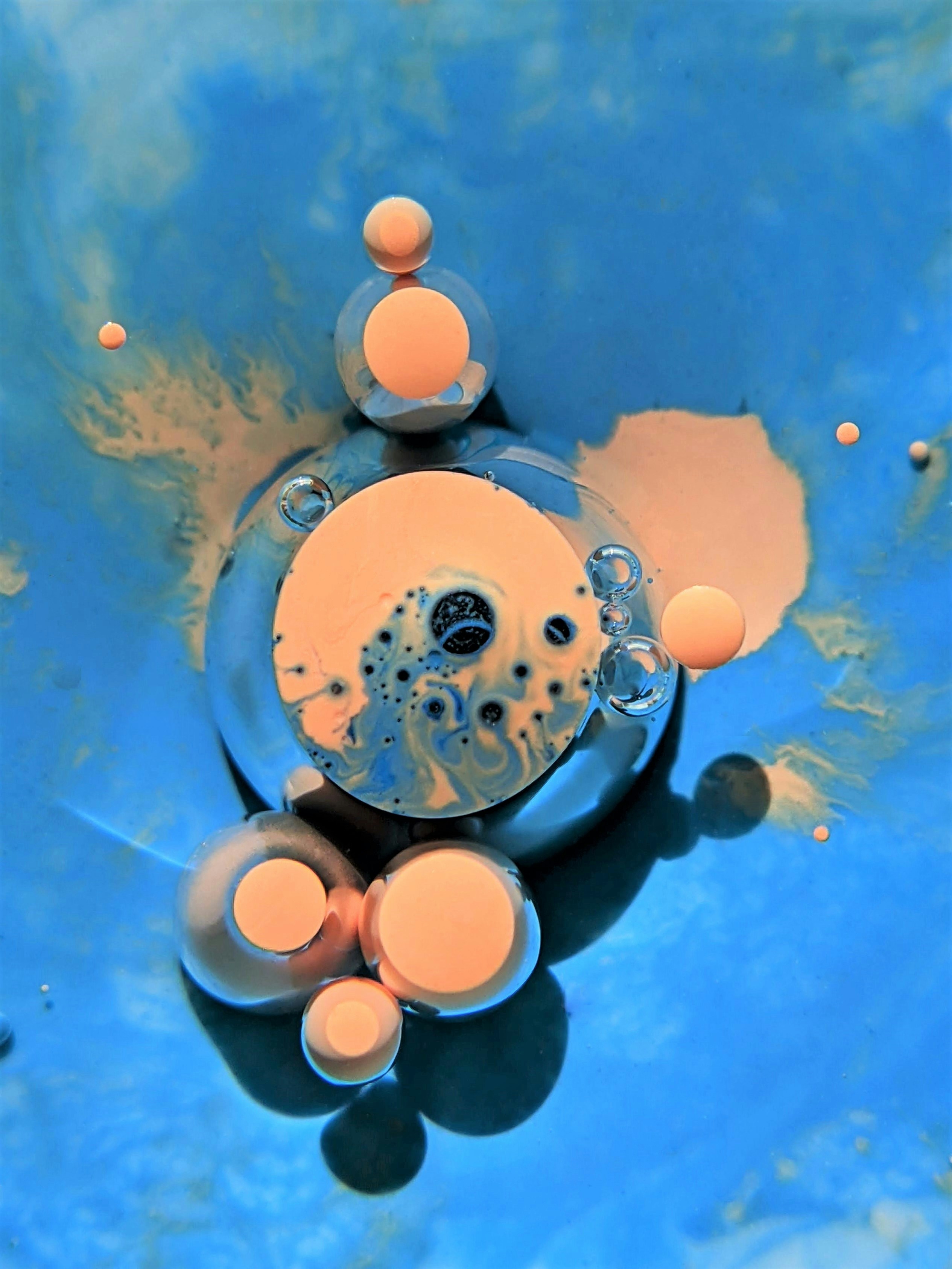 A close up of a blue and orange object photo – Free Blue Image on Unsplash