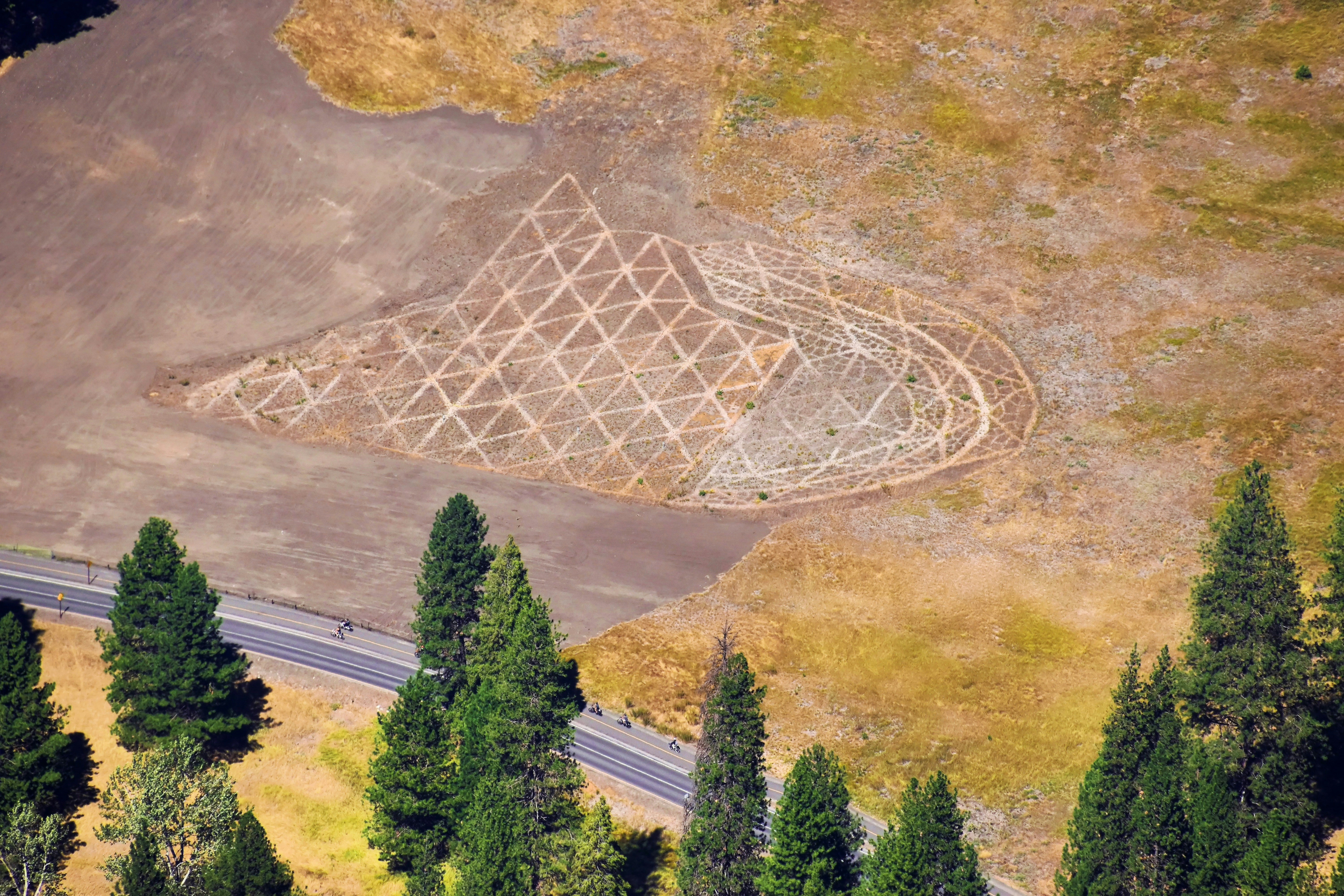 An aerial view of a large triangular structure in the middle of a ...