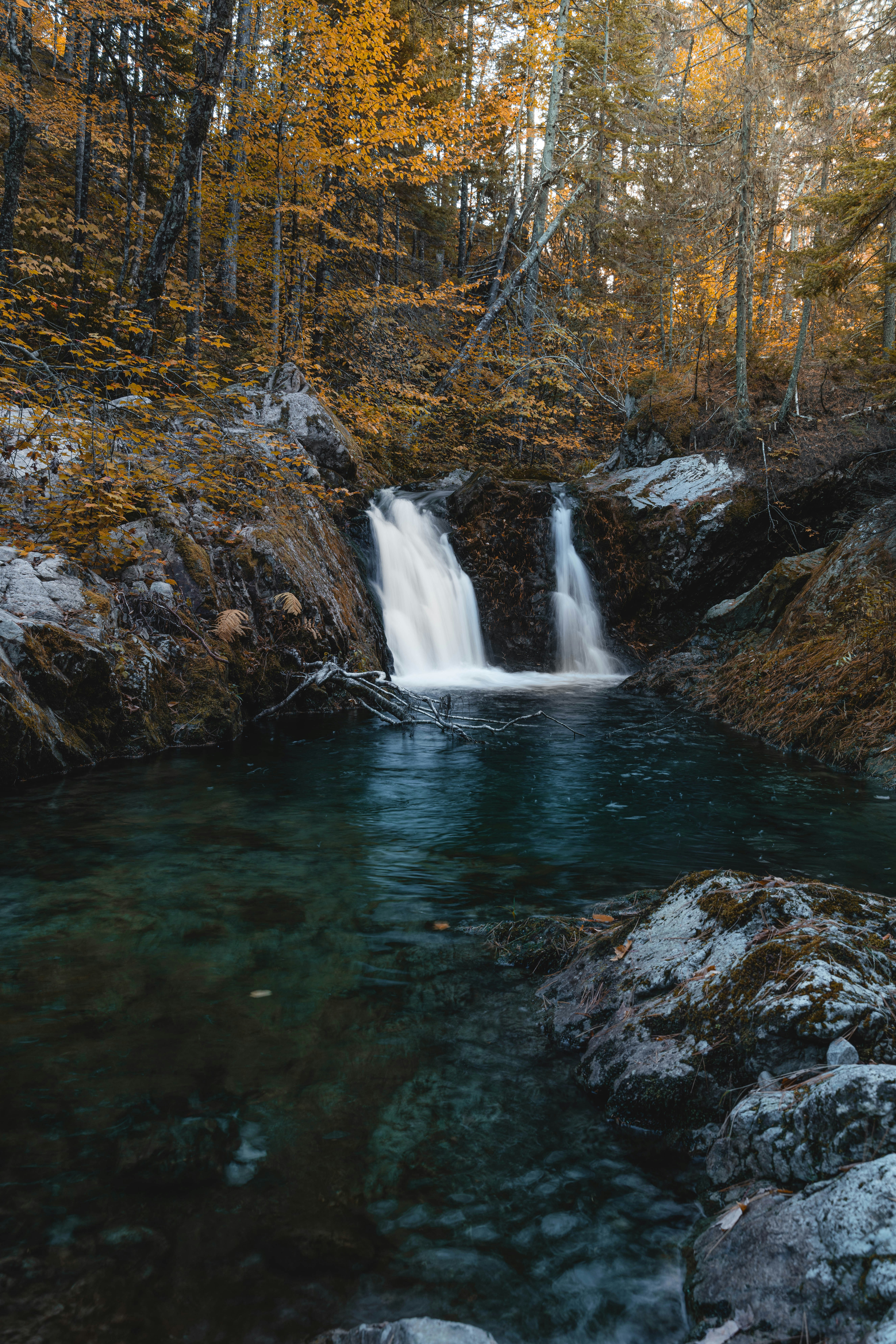 Whispering Falls in Autumn Cloak