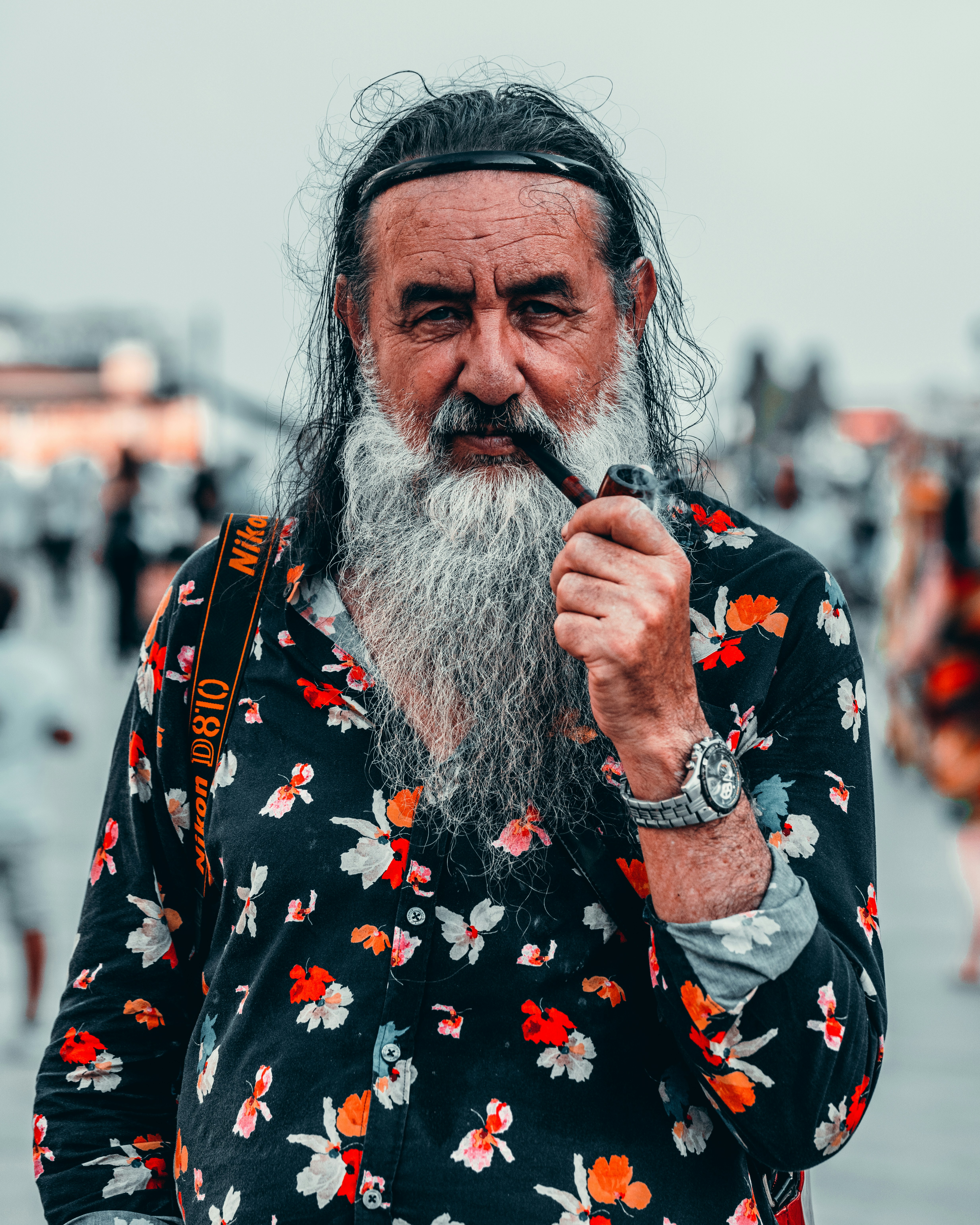 Floral Shirt, Pipe, and Street Light: A Quiet Portrait in Motion