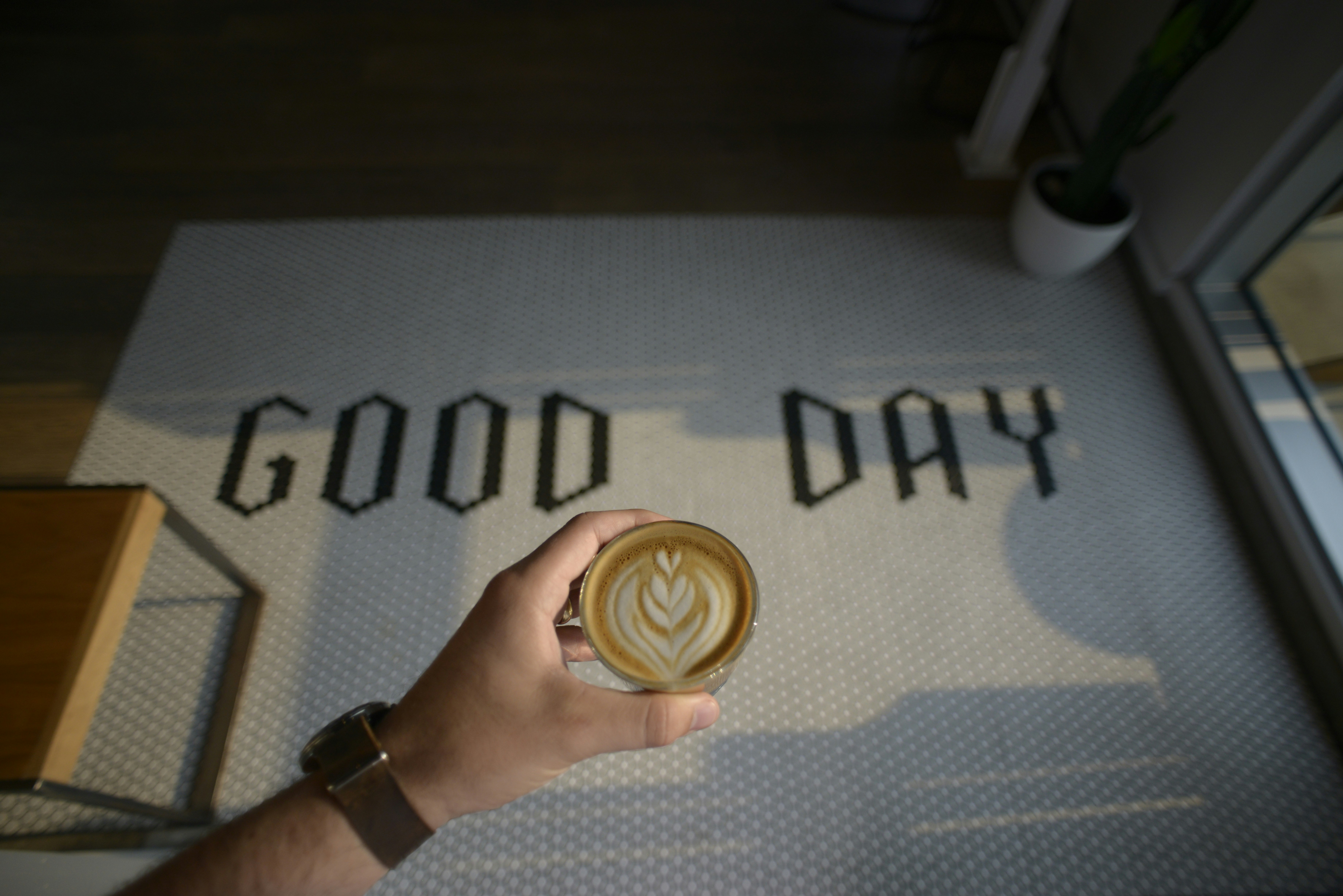 Latte Art Over a Good Day Floor