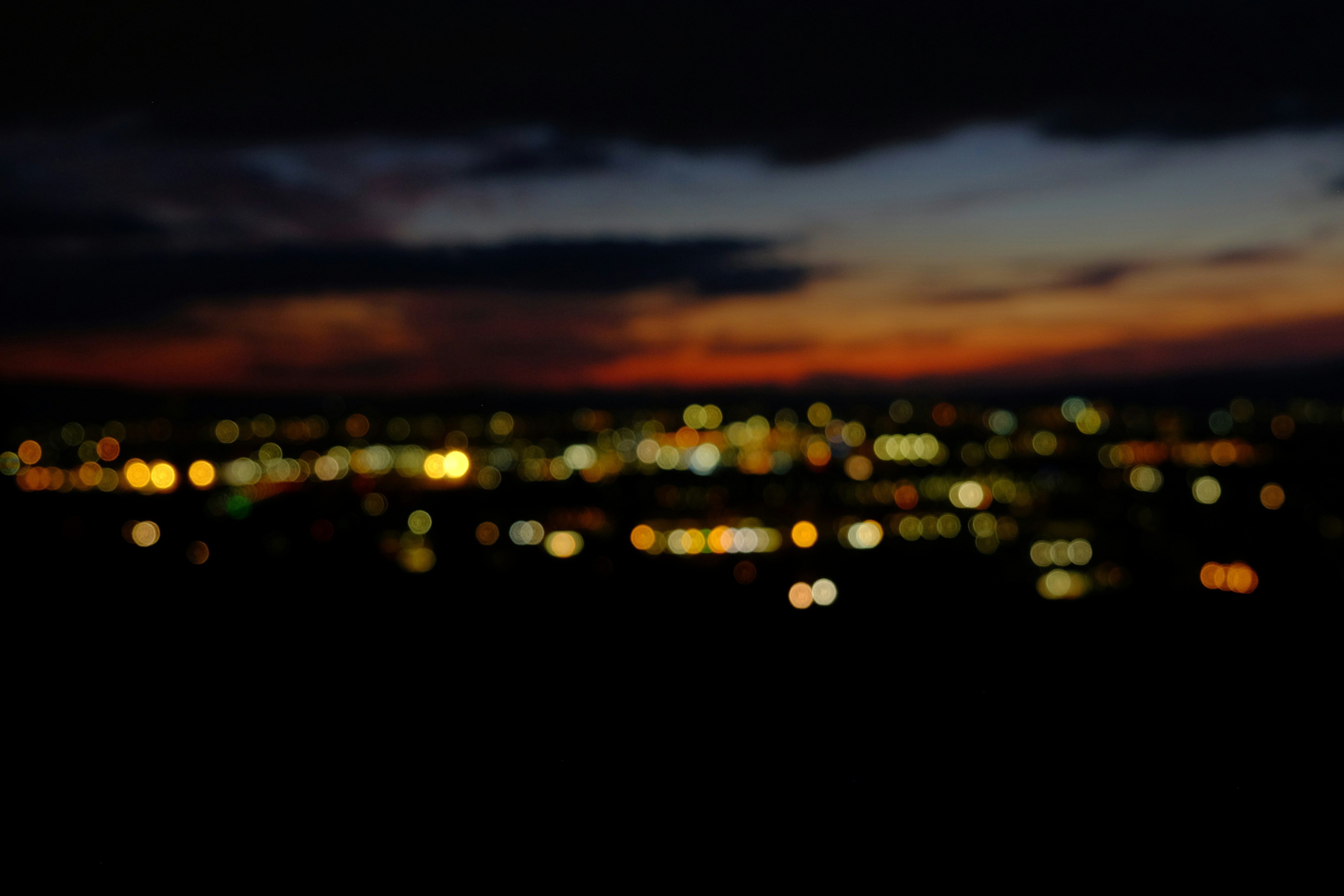 Velvet Dusk Over a City of Bokeh
