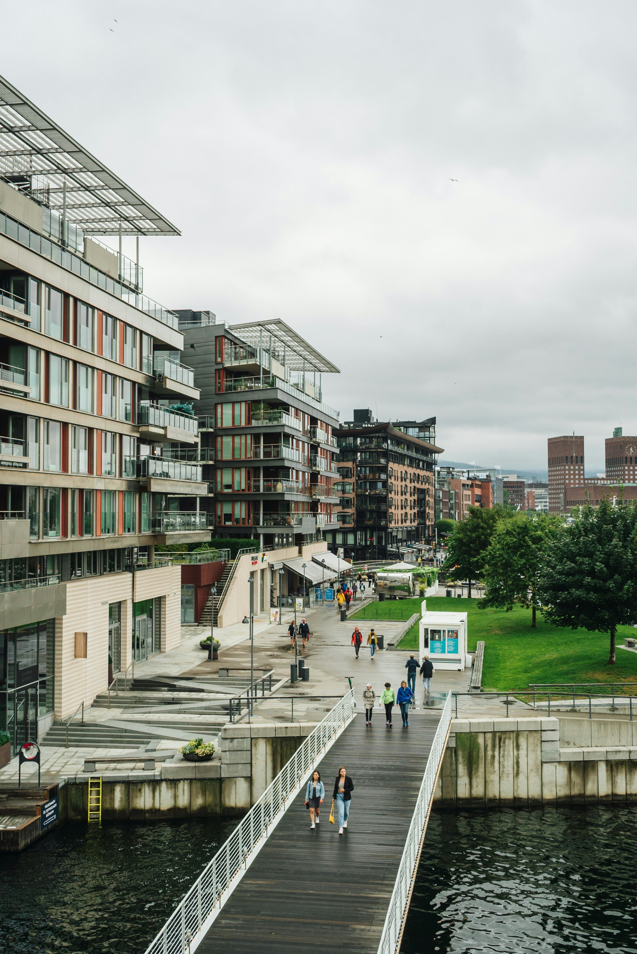 Boardwalk Between Modern Clusters: A Waterfront Cityscape