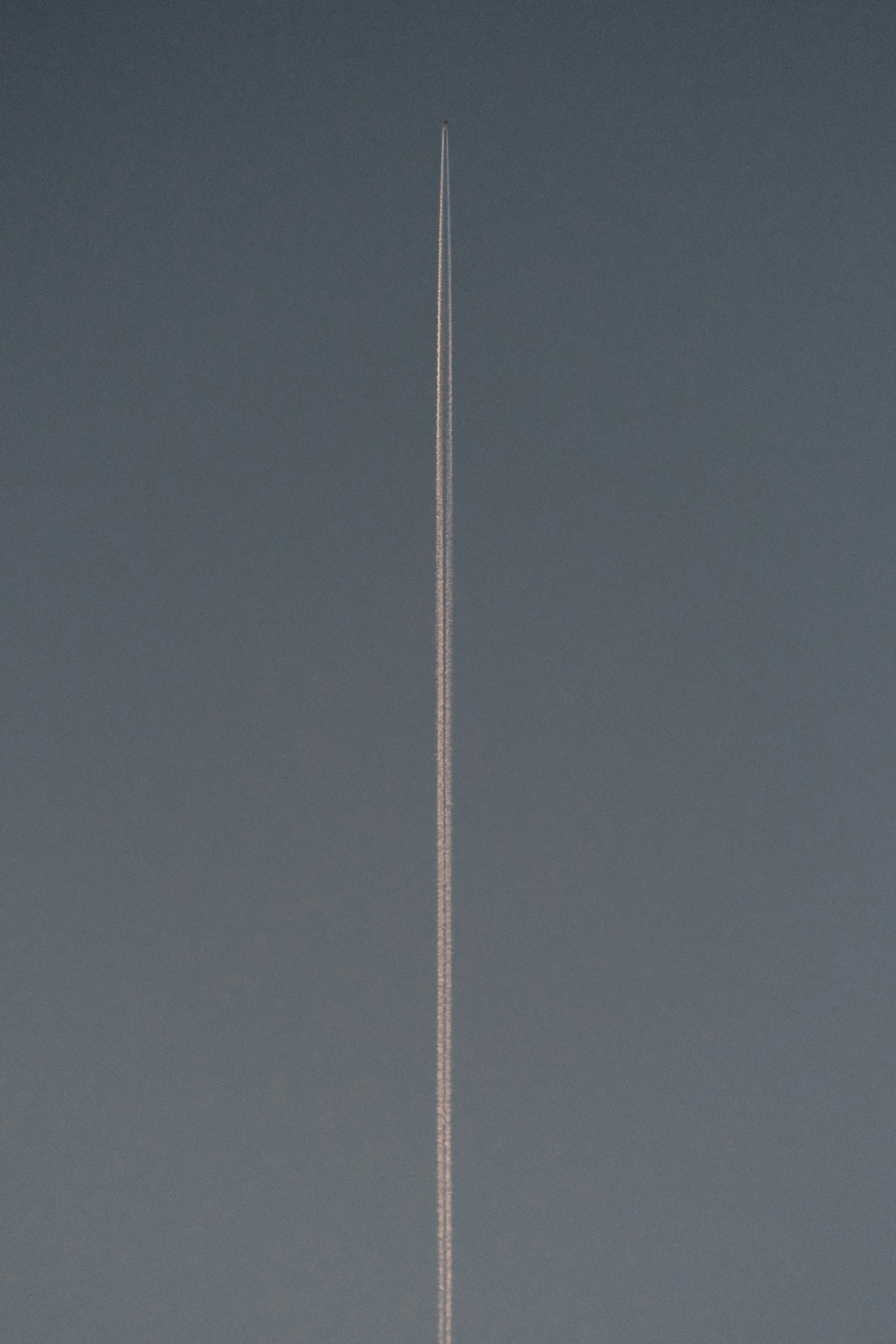 An airplane is flying high in the sky photo – Free Jet stream Image on ...