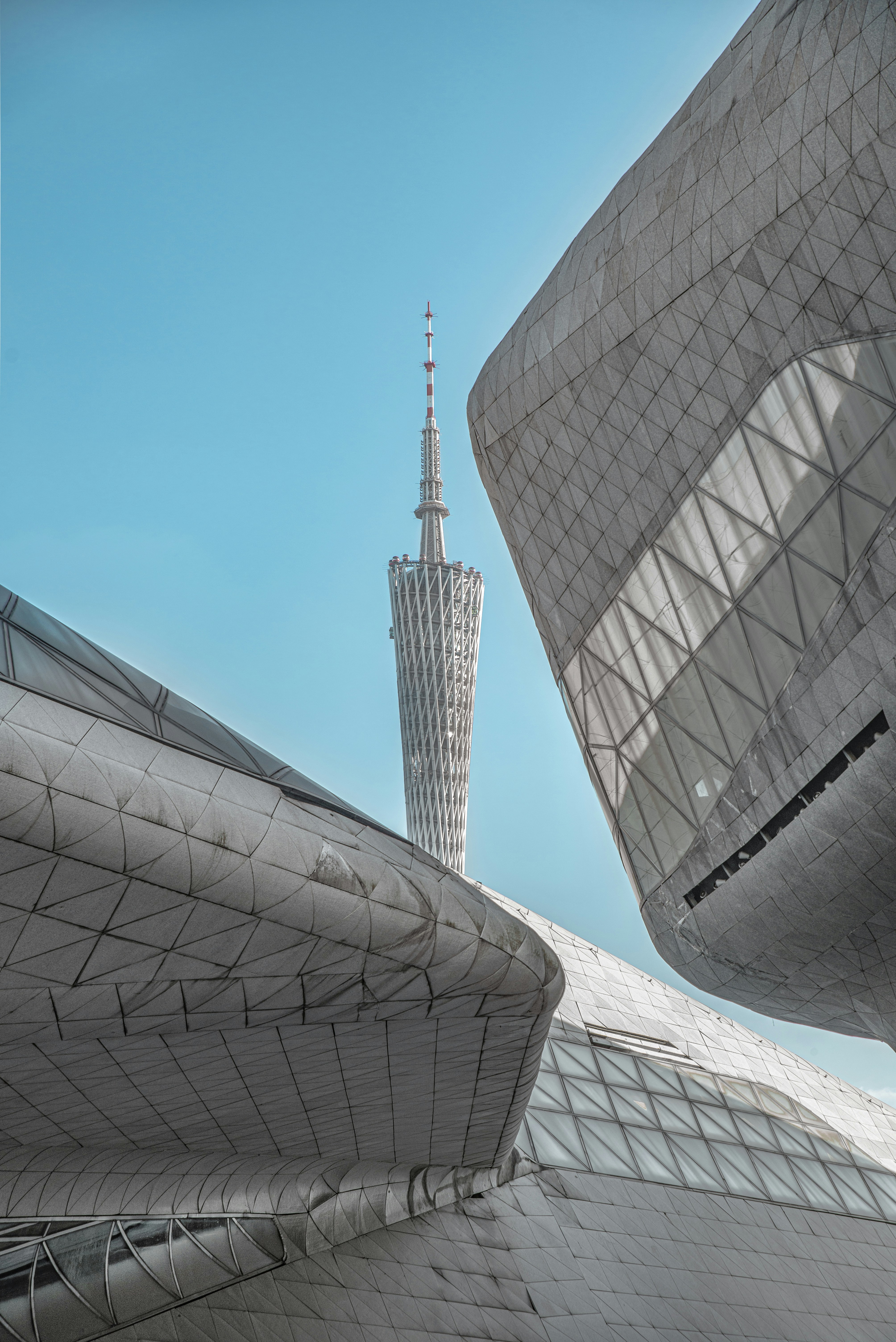 A very tall building with a very tall tower in the background photo ...