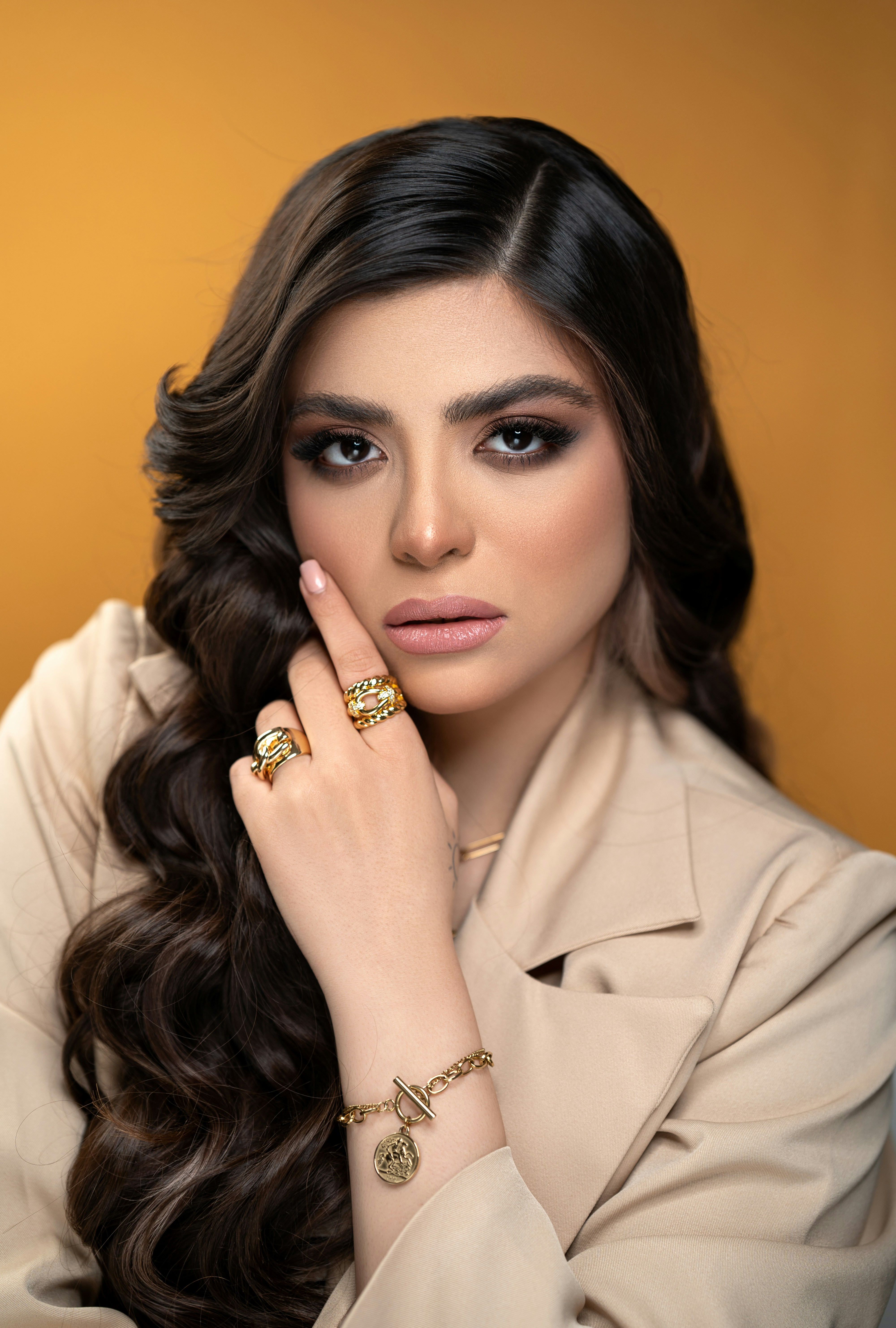 A woman in a trench coat with a ring on her finger photo – Free Coat ...