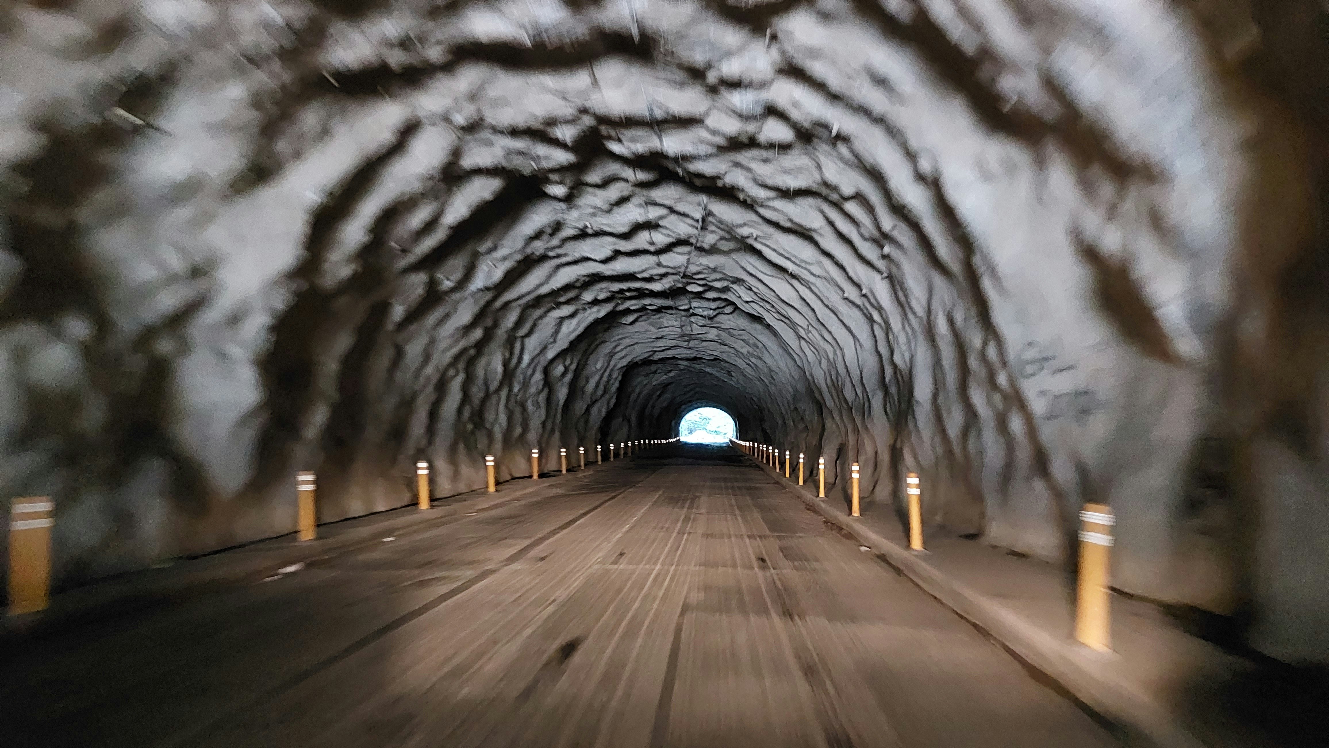 A long tunnel with a light at the end photo – Free Vidraru Image on ...