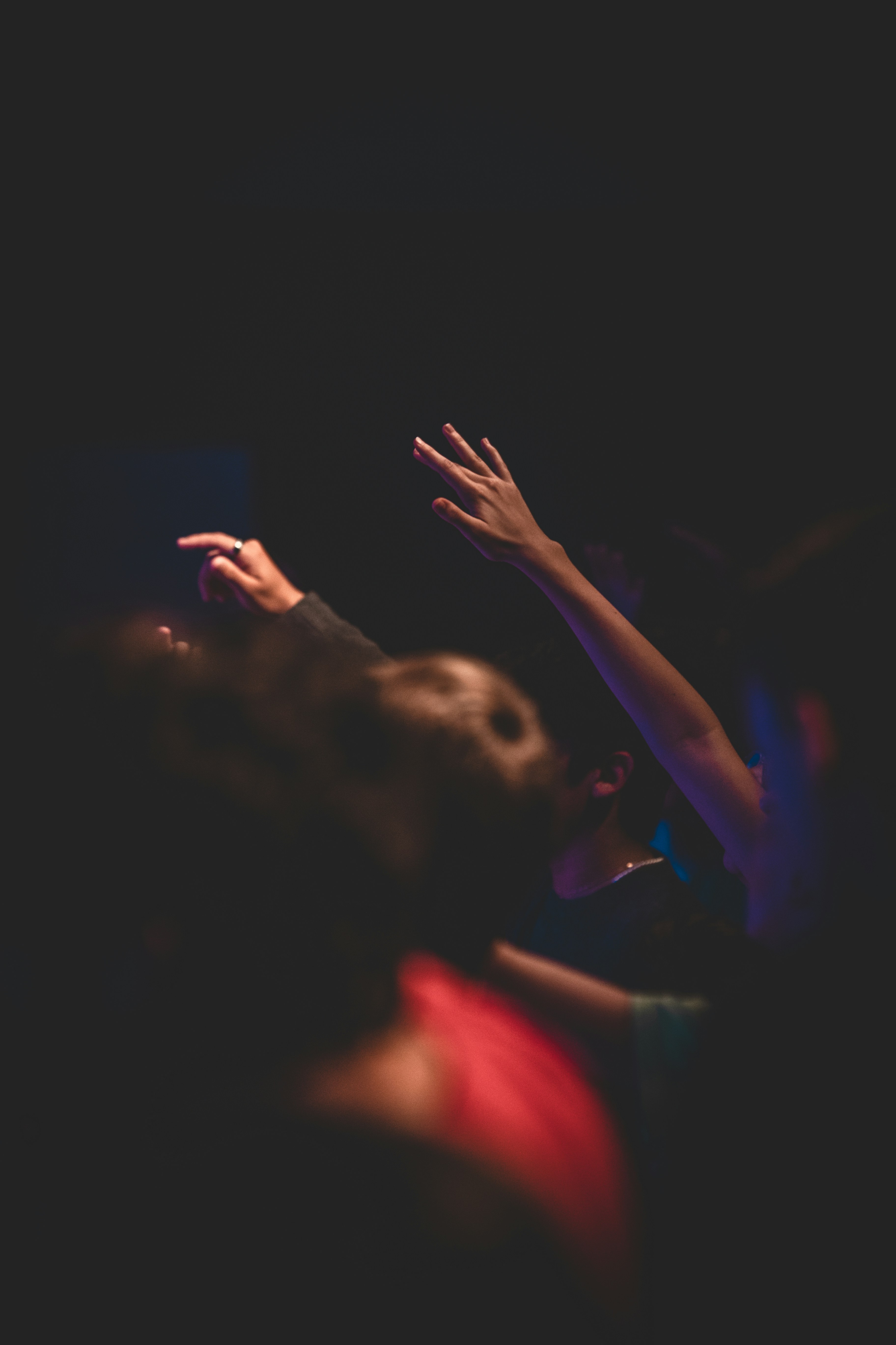 A group of people reaching up in the air photo – Free Brown Image on ...