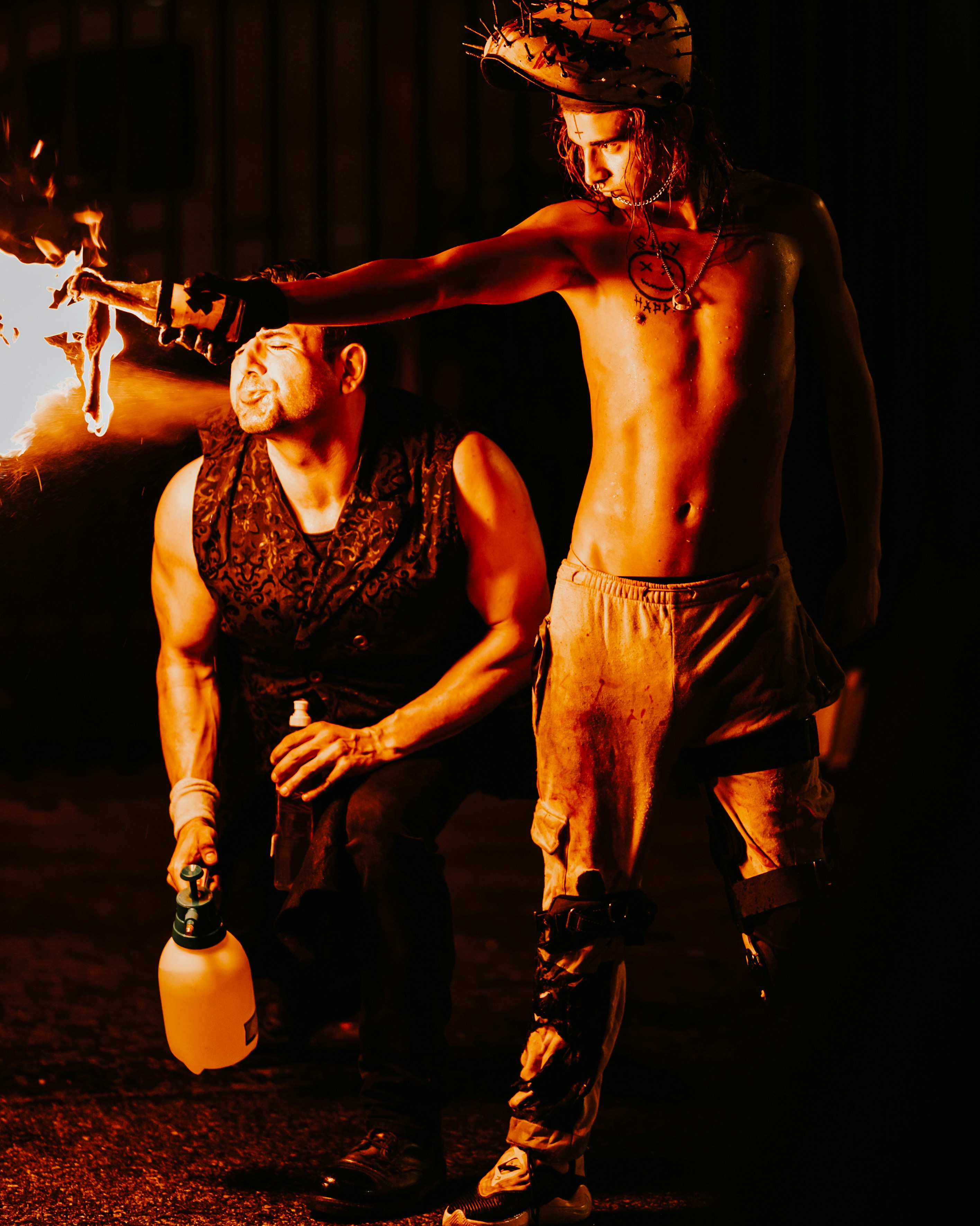 a couple of men standing next to each other