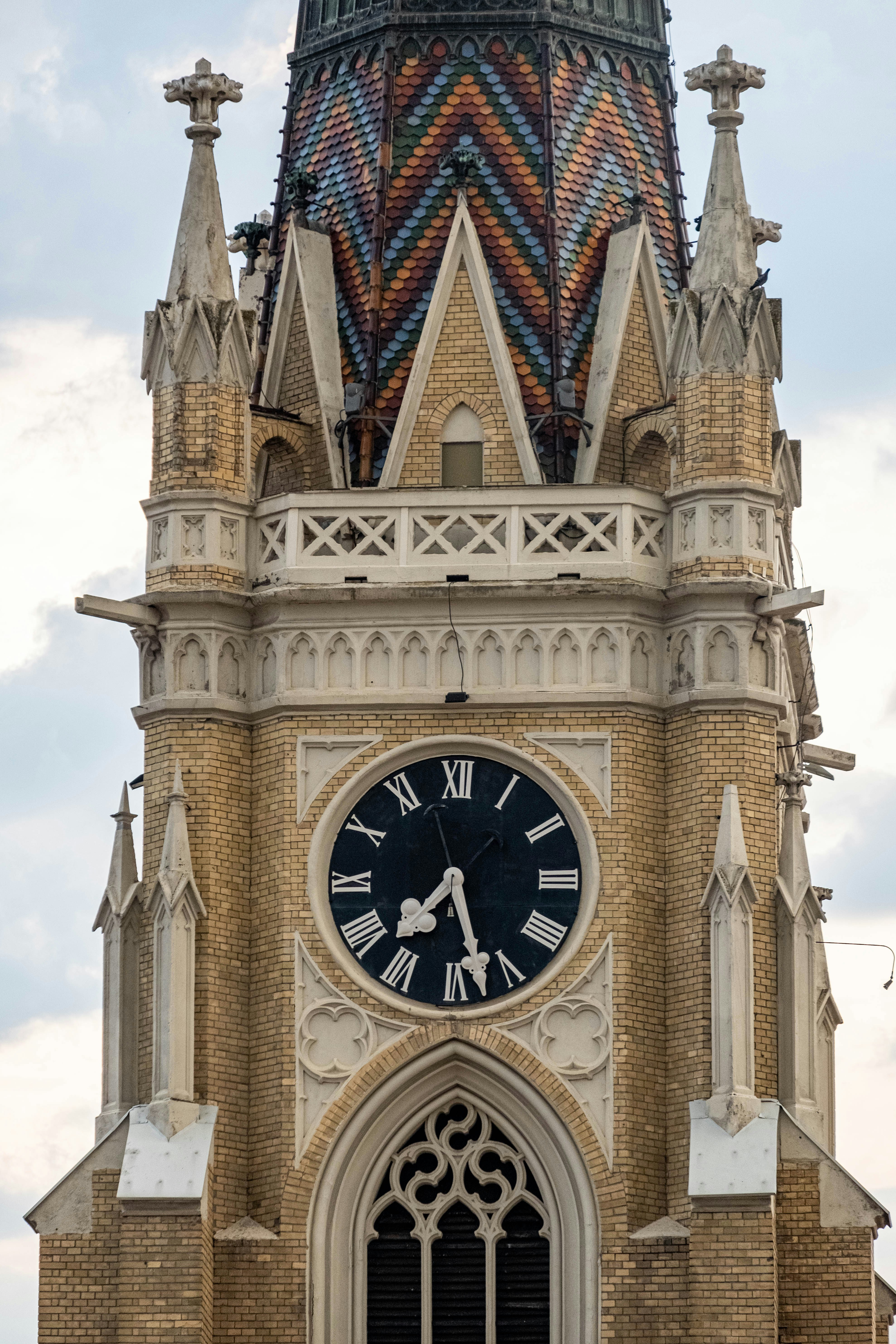A large clock tower with a clock on each of it's sides photo – Free ...