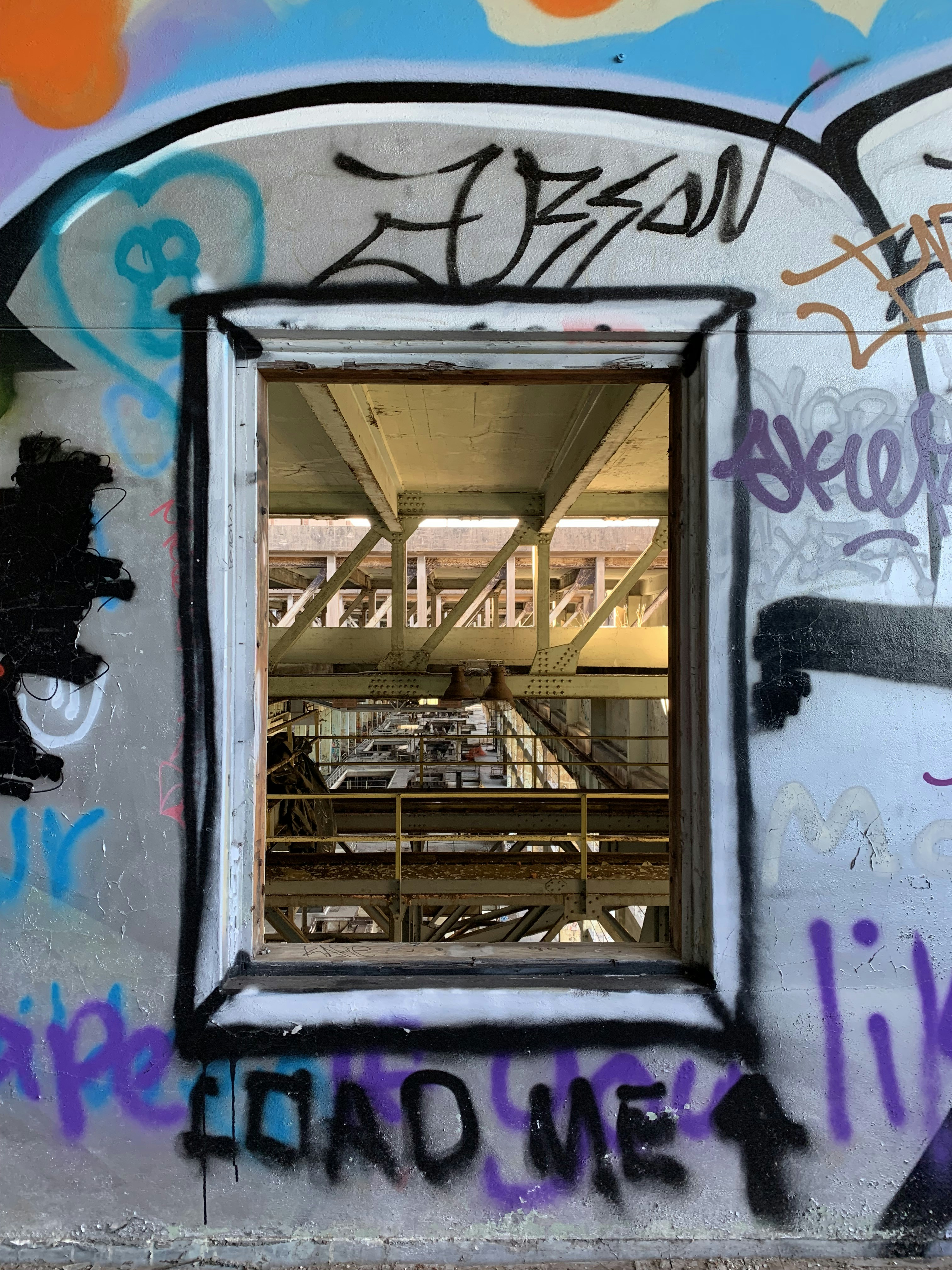 Through the Graffiti Portal: Industrial Frameses in a Window of Color