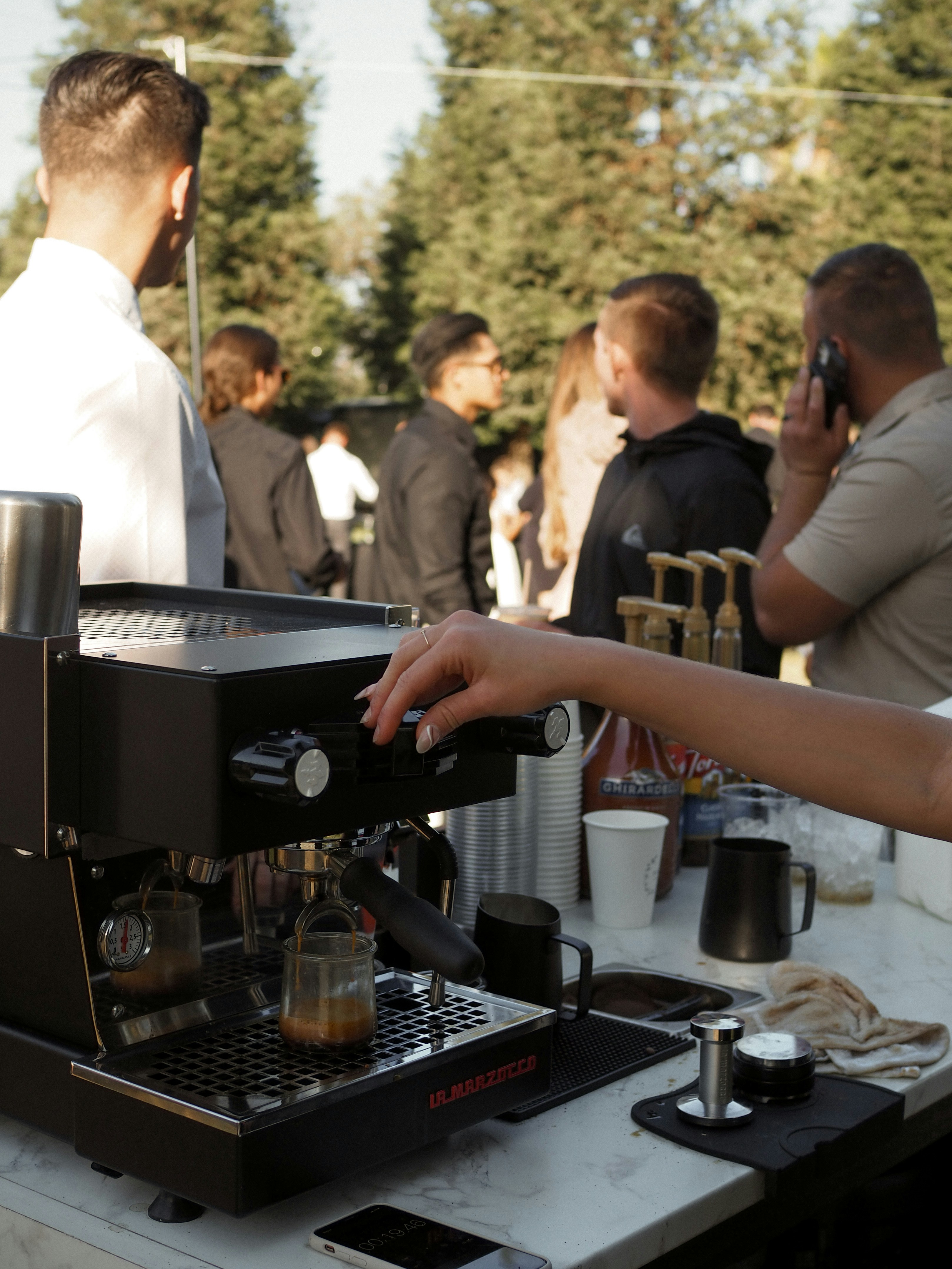Barista at the Espresso Station: Craft and Crowd