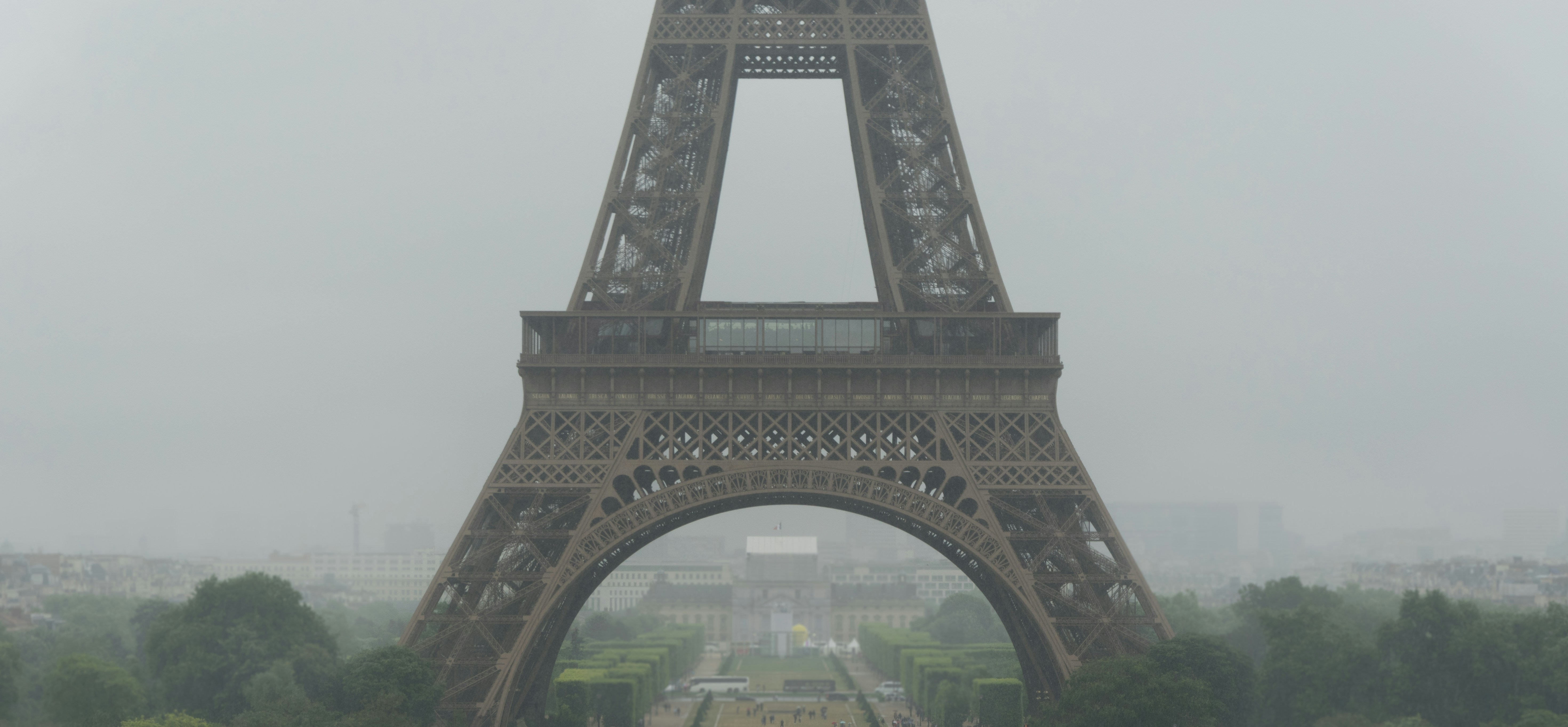 Eiffel in the Mist: Iron Lace Emerges from Parisian Fog