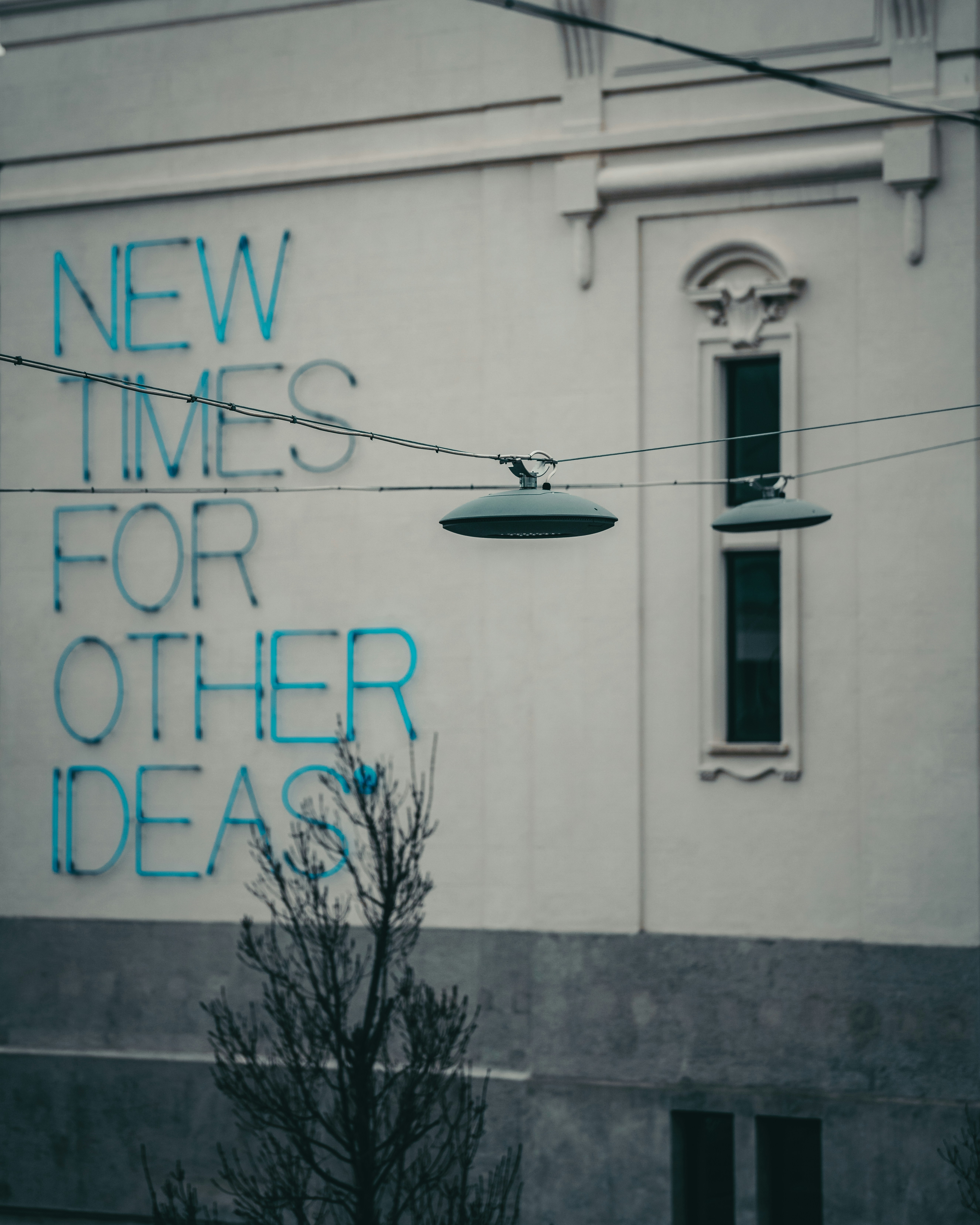 Neon Script over Silent Facade