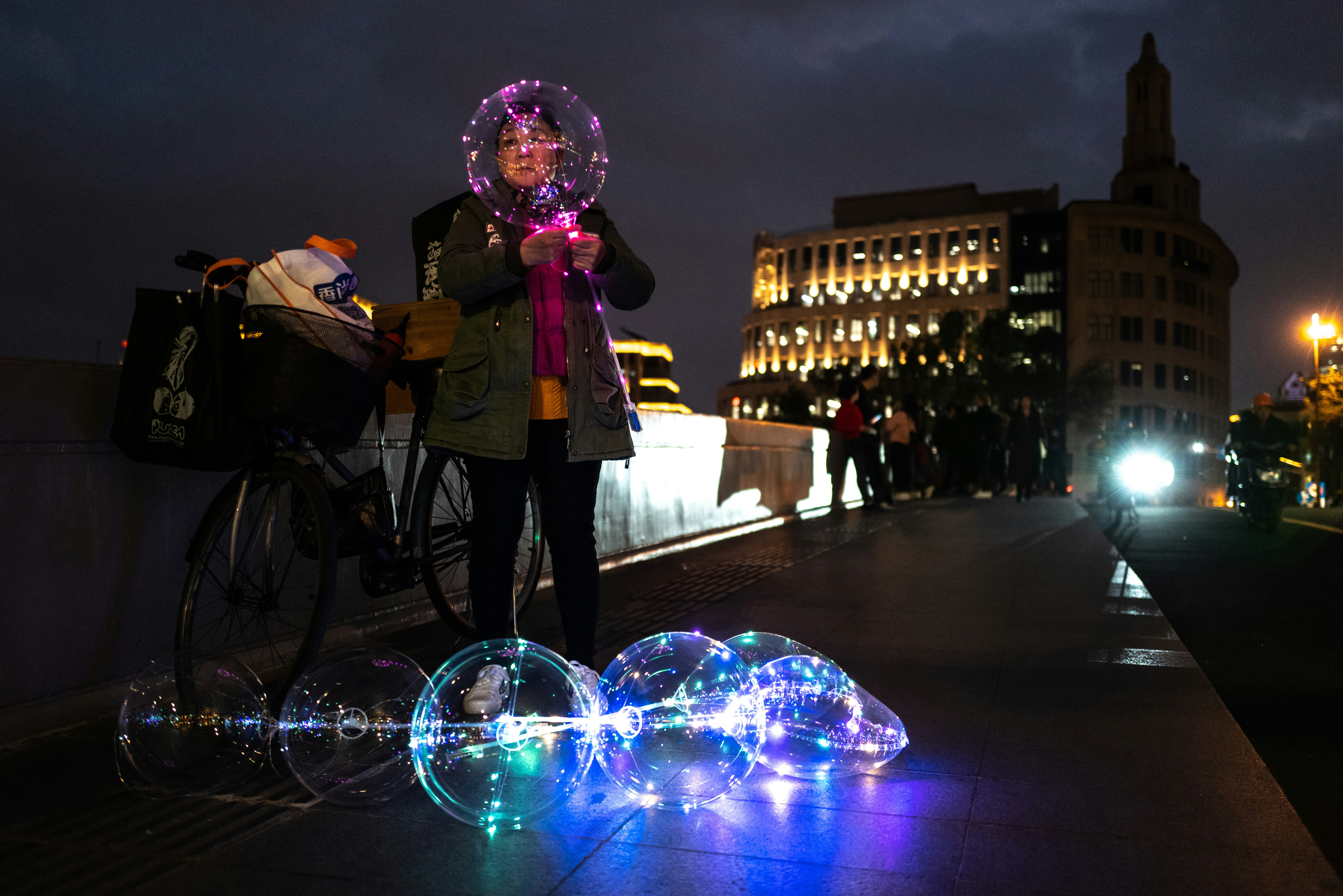 Glowing Orbs by Night: Street Vendor with LED Bubbles