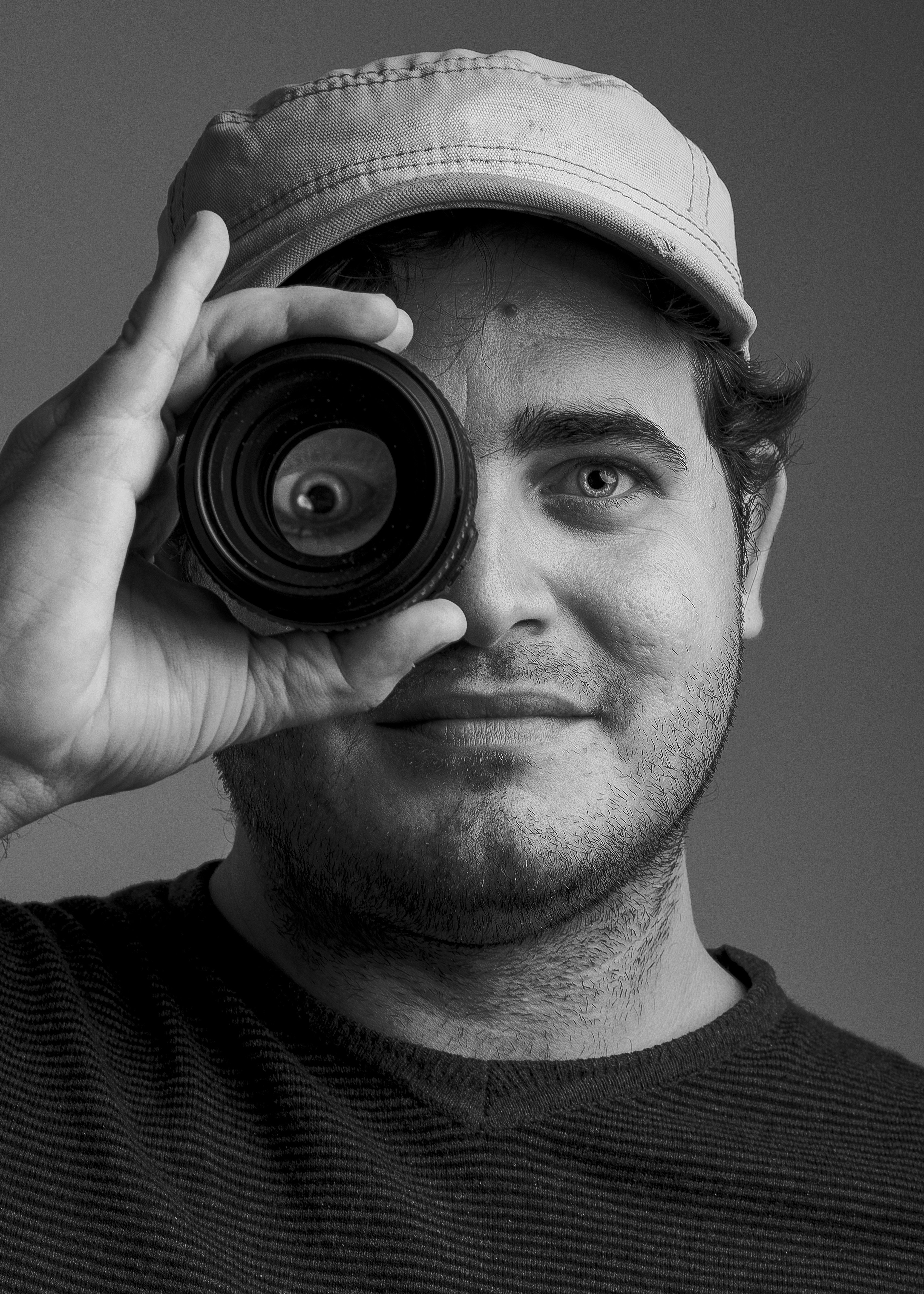 Through One Eye and a Lens: A Black-and-White Portrait