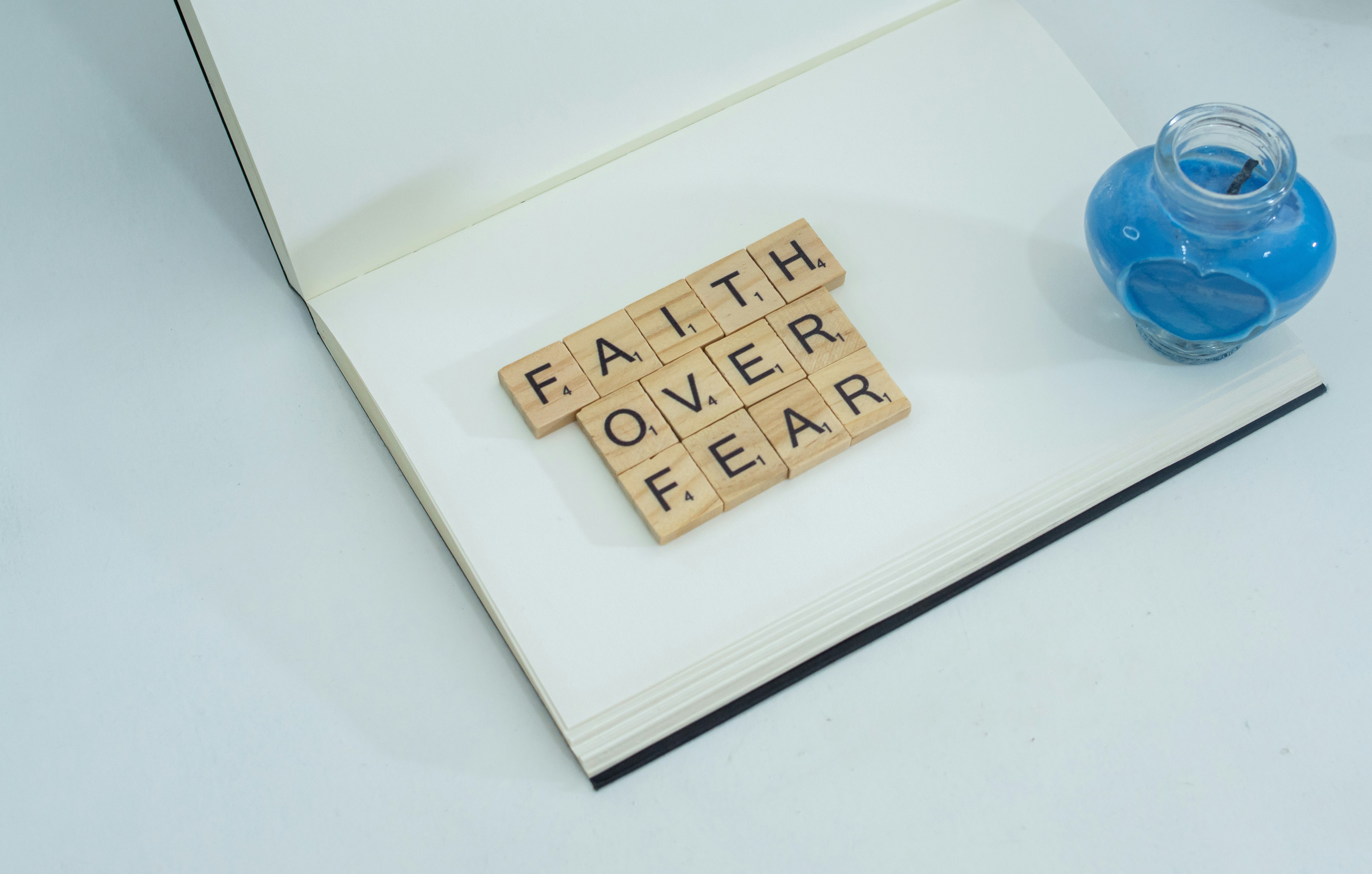 A scrabble of letters spelling faith over fear photo – Free Faith over ...